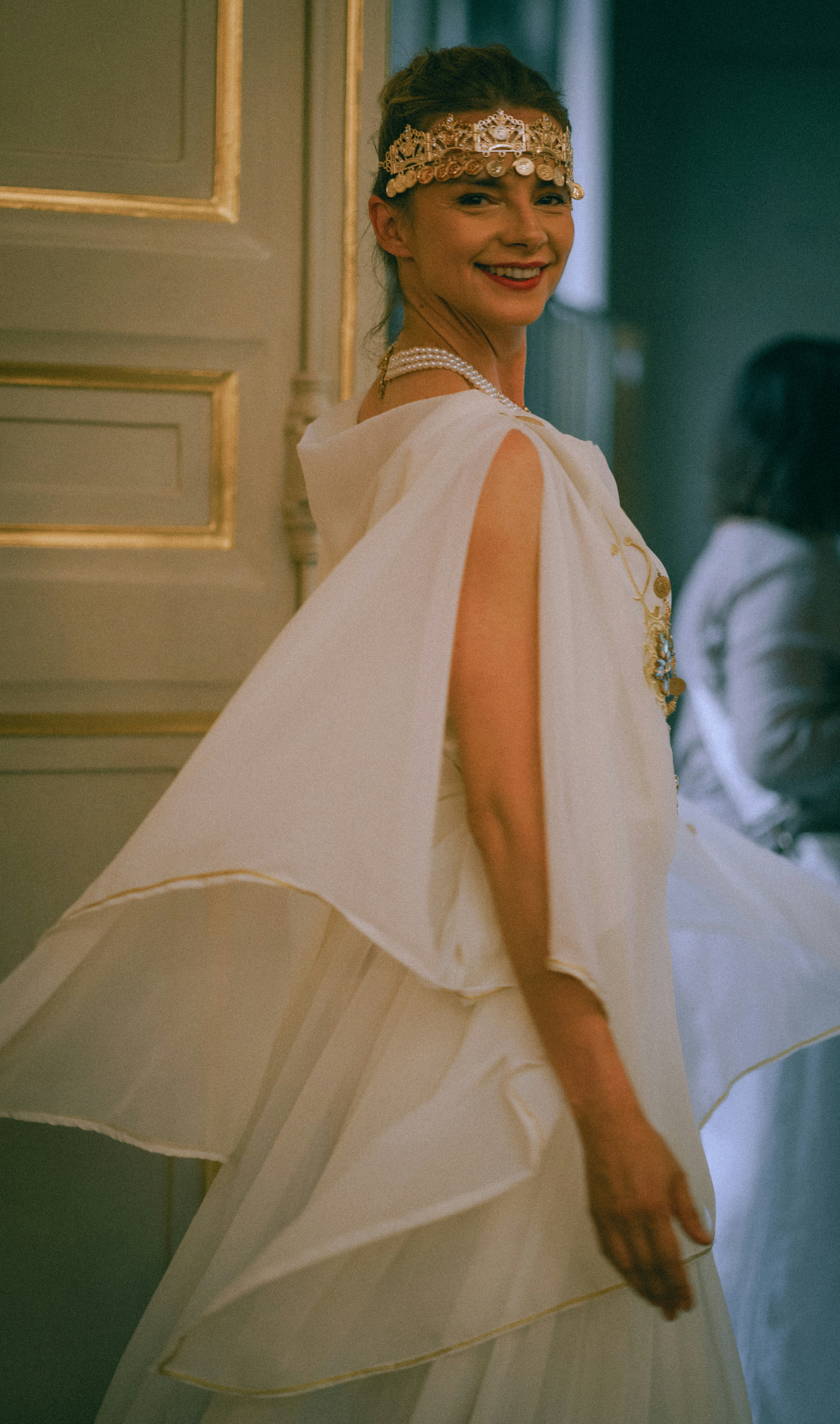 Graceful Spin: A Bride in Gold Lace and White Silk