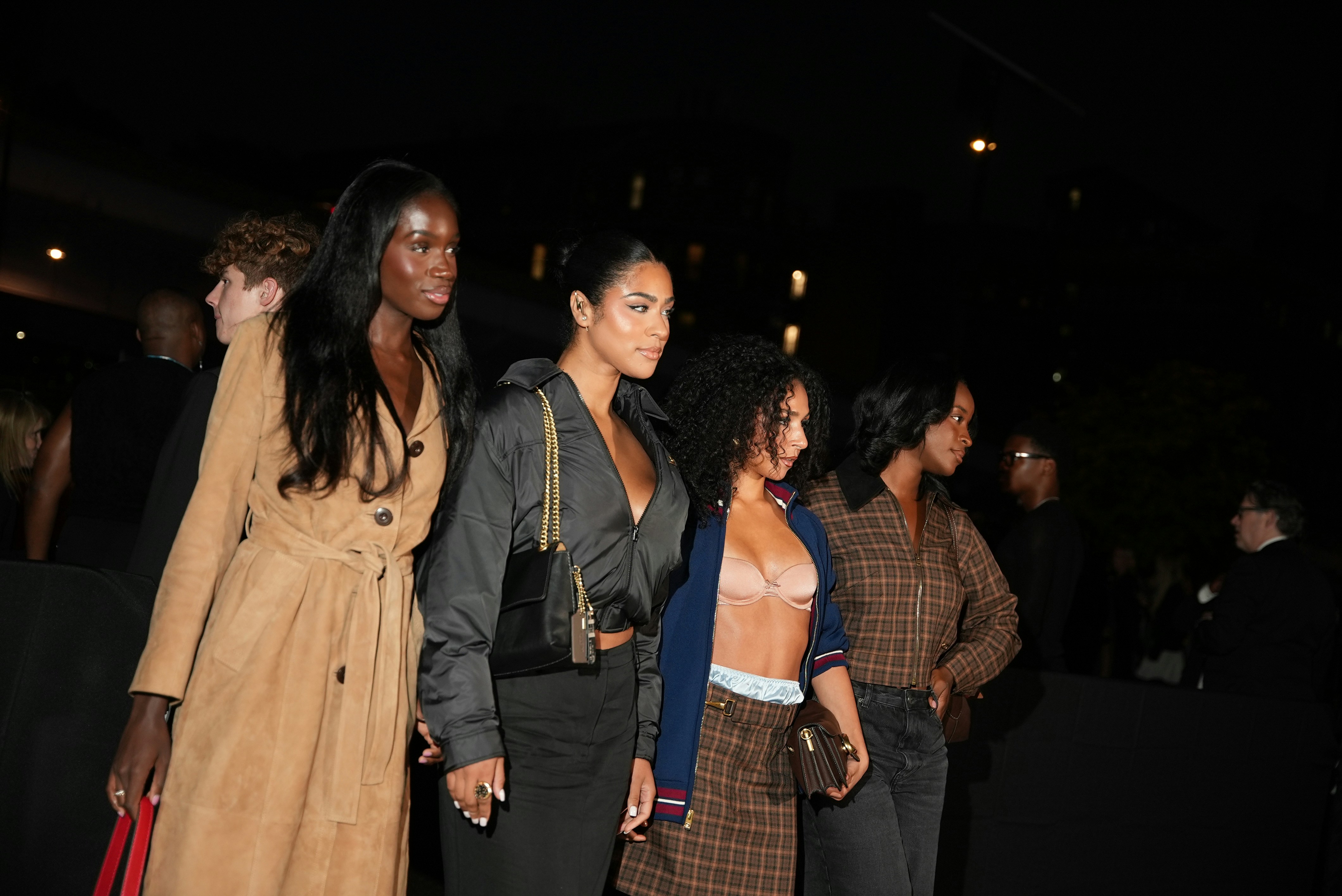 Line of luminous confidence: a quartet of models stepping into the night