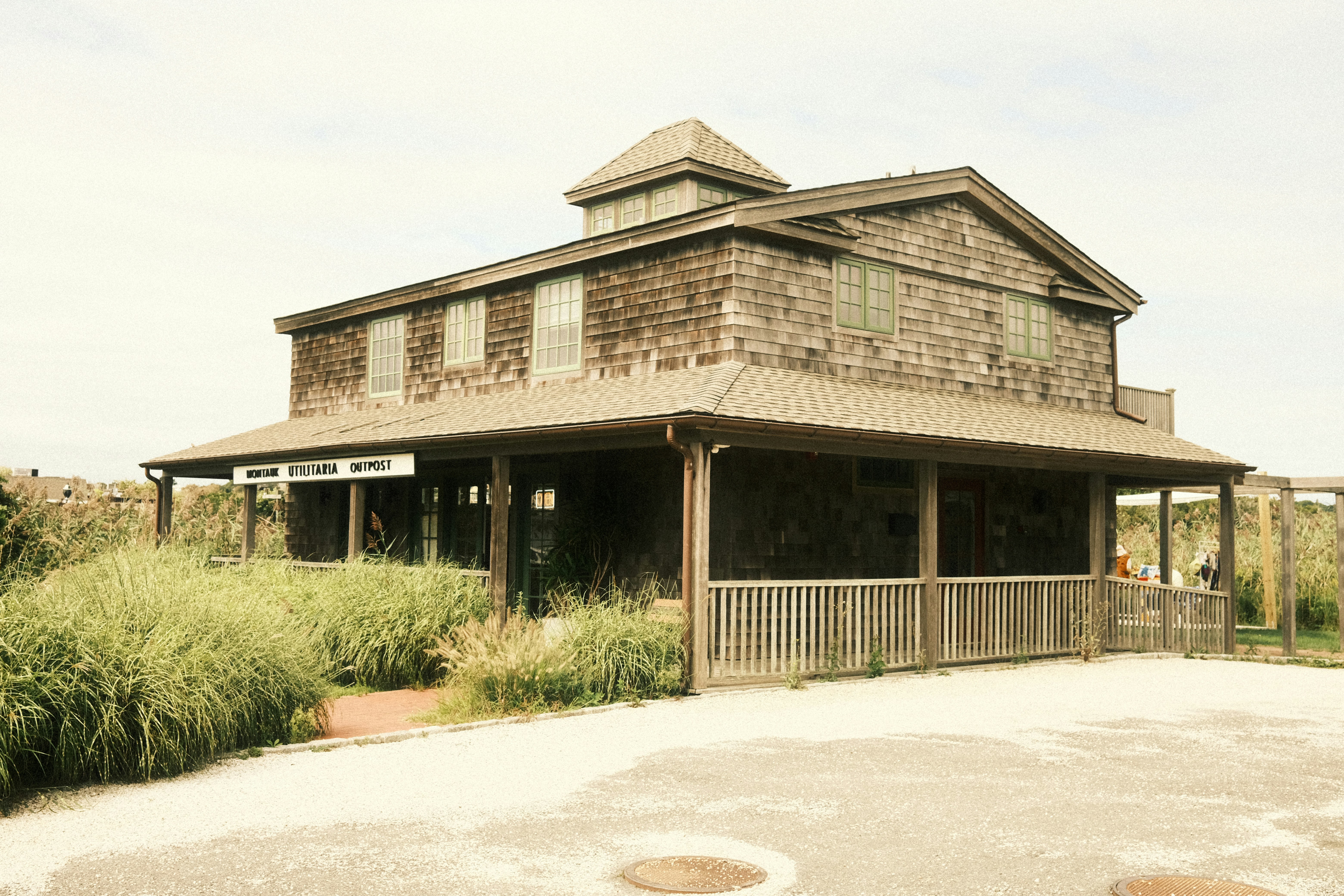 Deserted Wooden Depot: Weathered Charm of a Coastal Railroad Stop