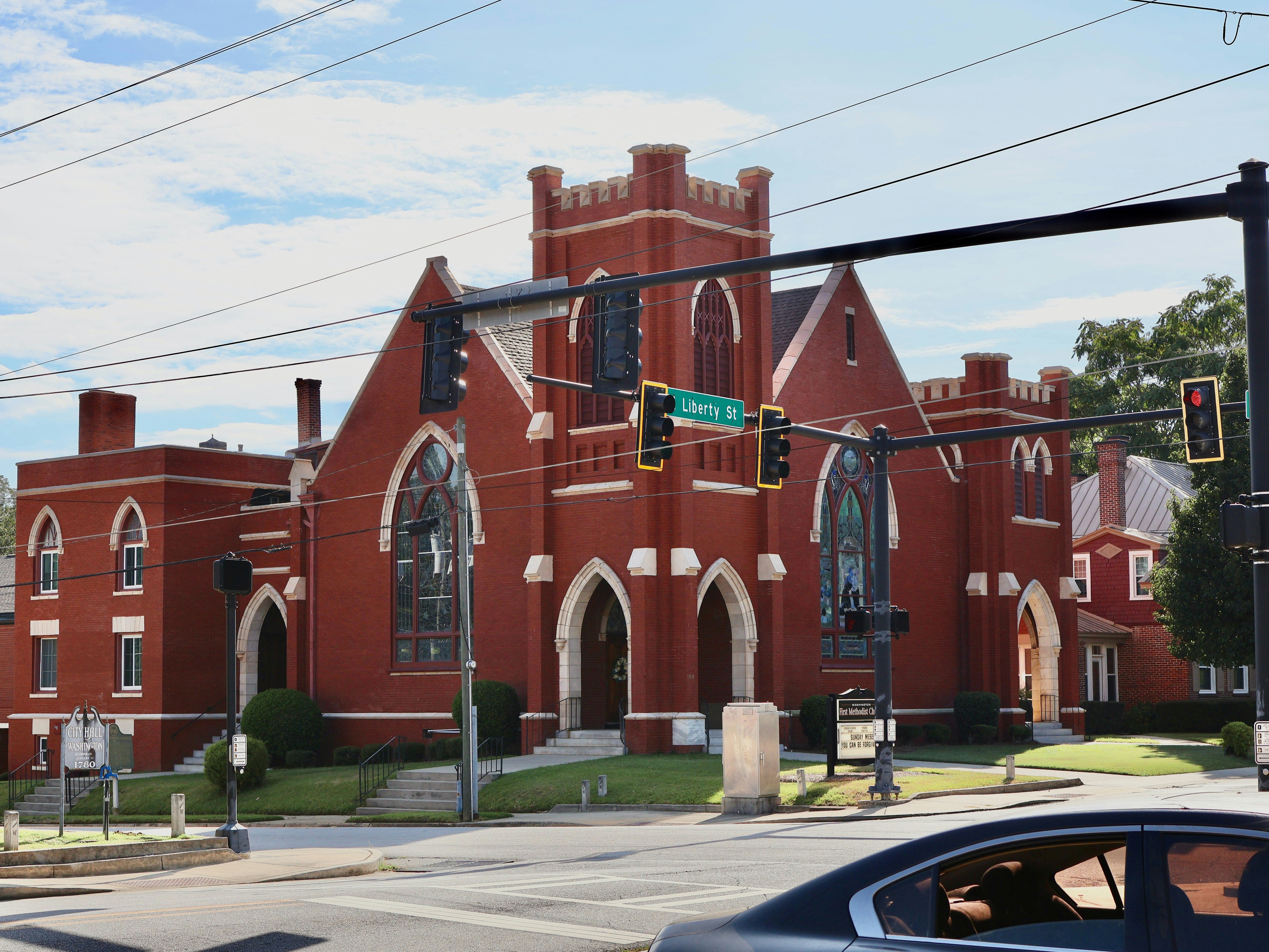 Brick Gothic Revival Church at an Urban Intersection