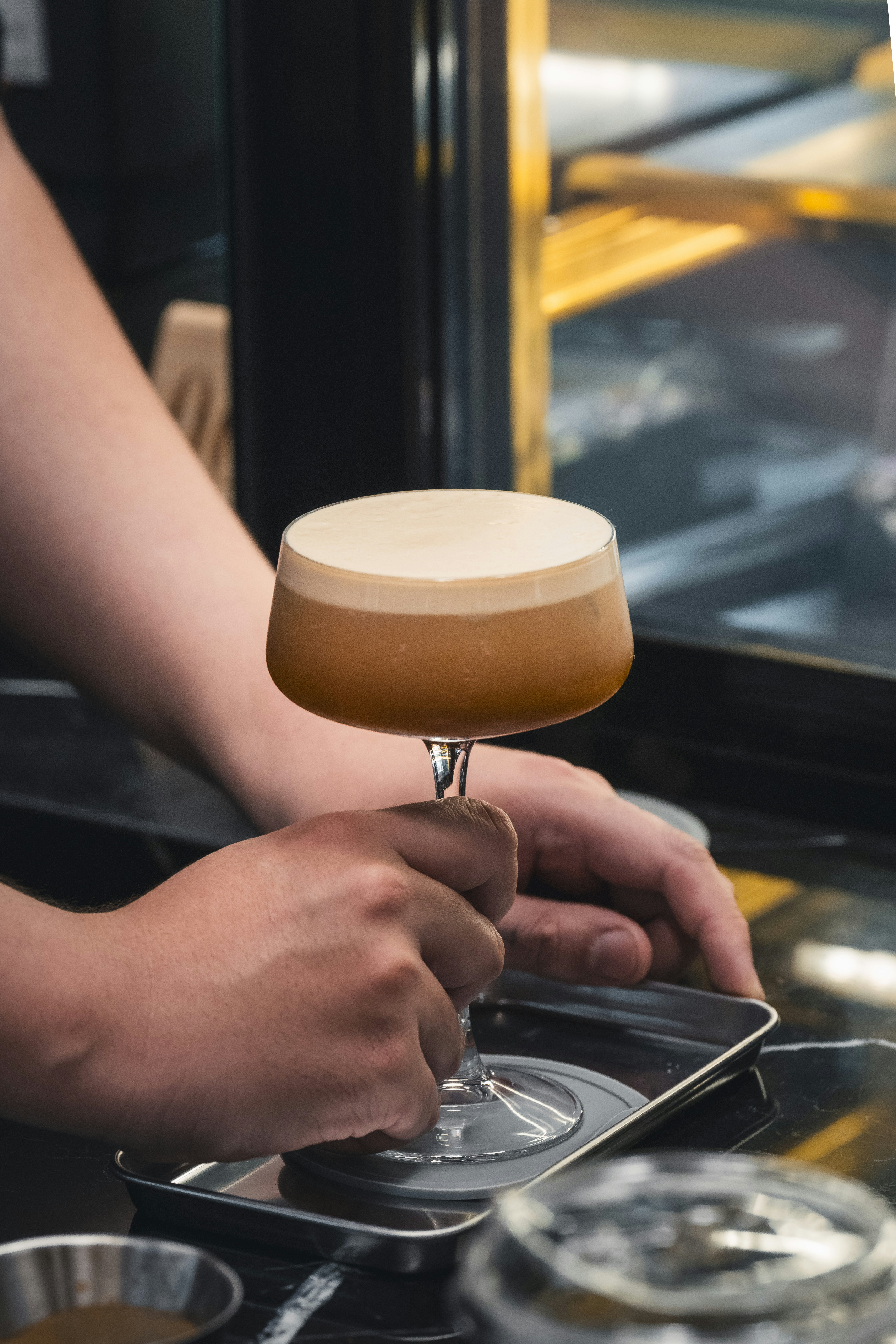 A Toast in Focus: Craft Beer Glassfuls at the Bar
