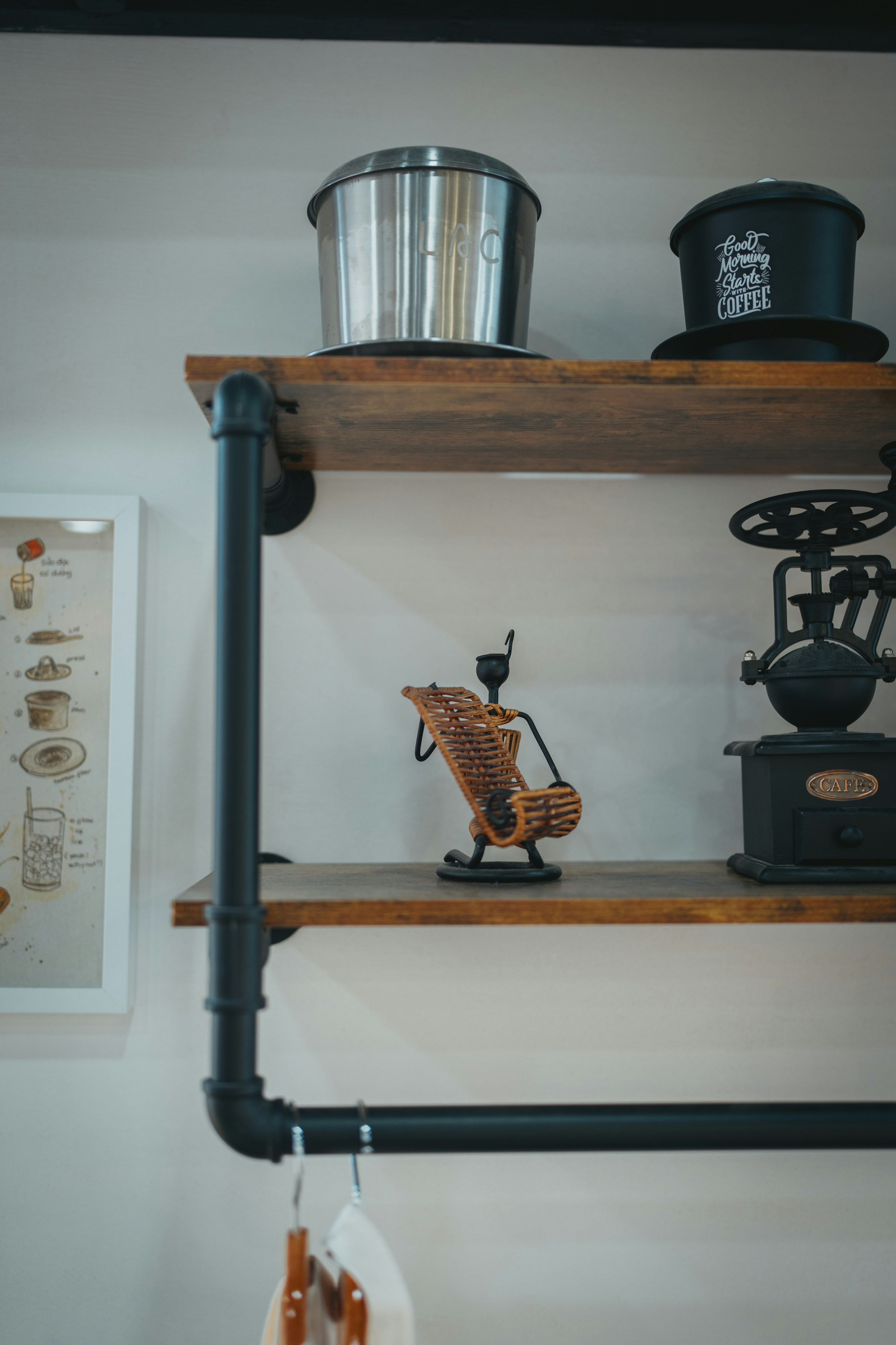 Retro Coffee Set on a Wooden Shelf with Industrial Pipe Framework