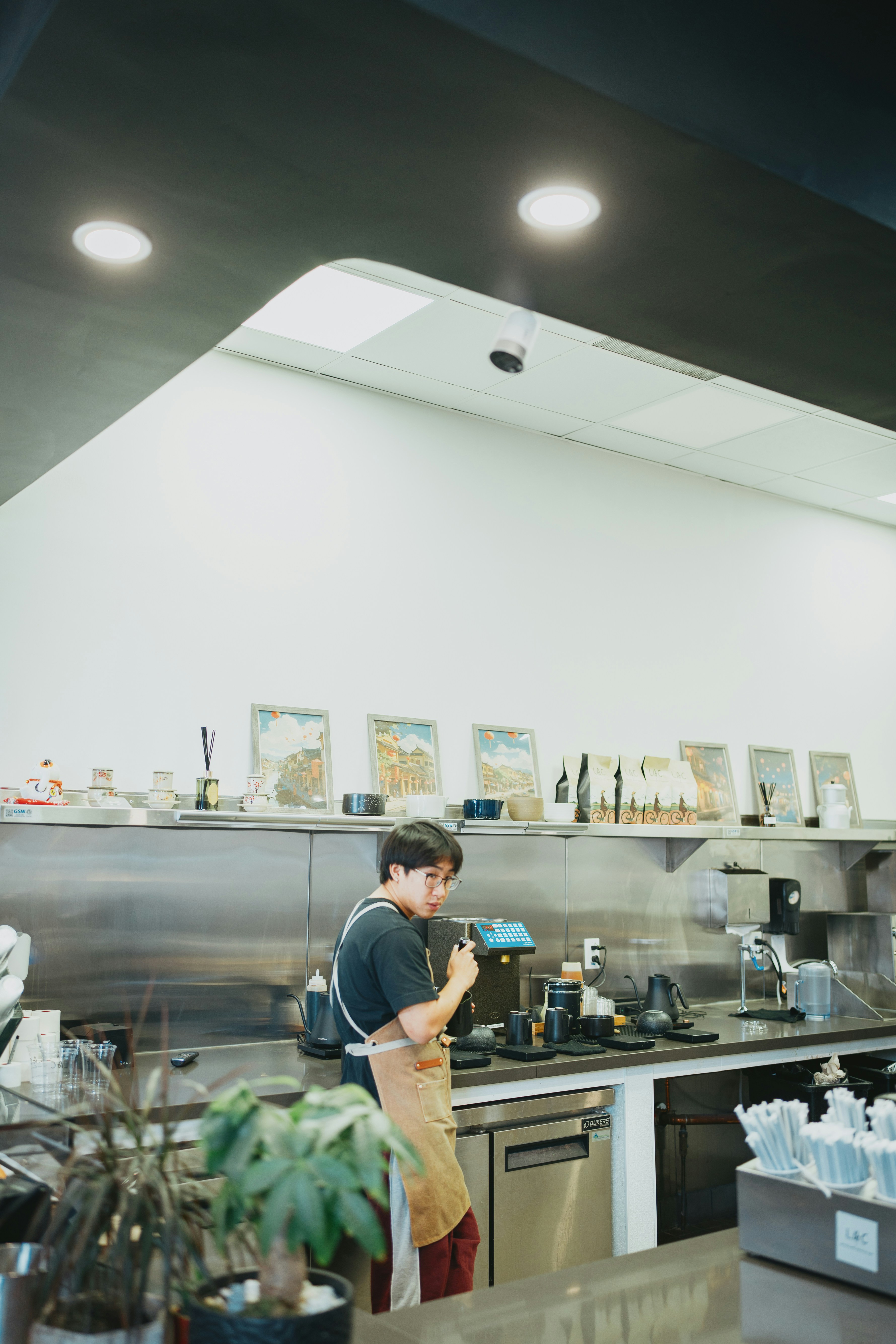 Barista at Work: A Quiet Moment Behind the Counter