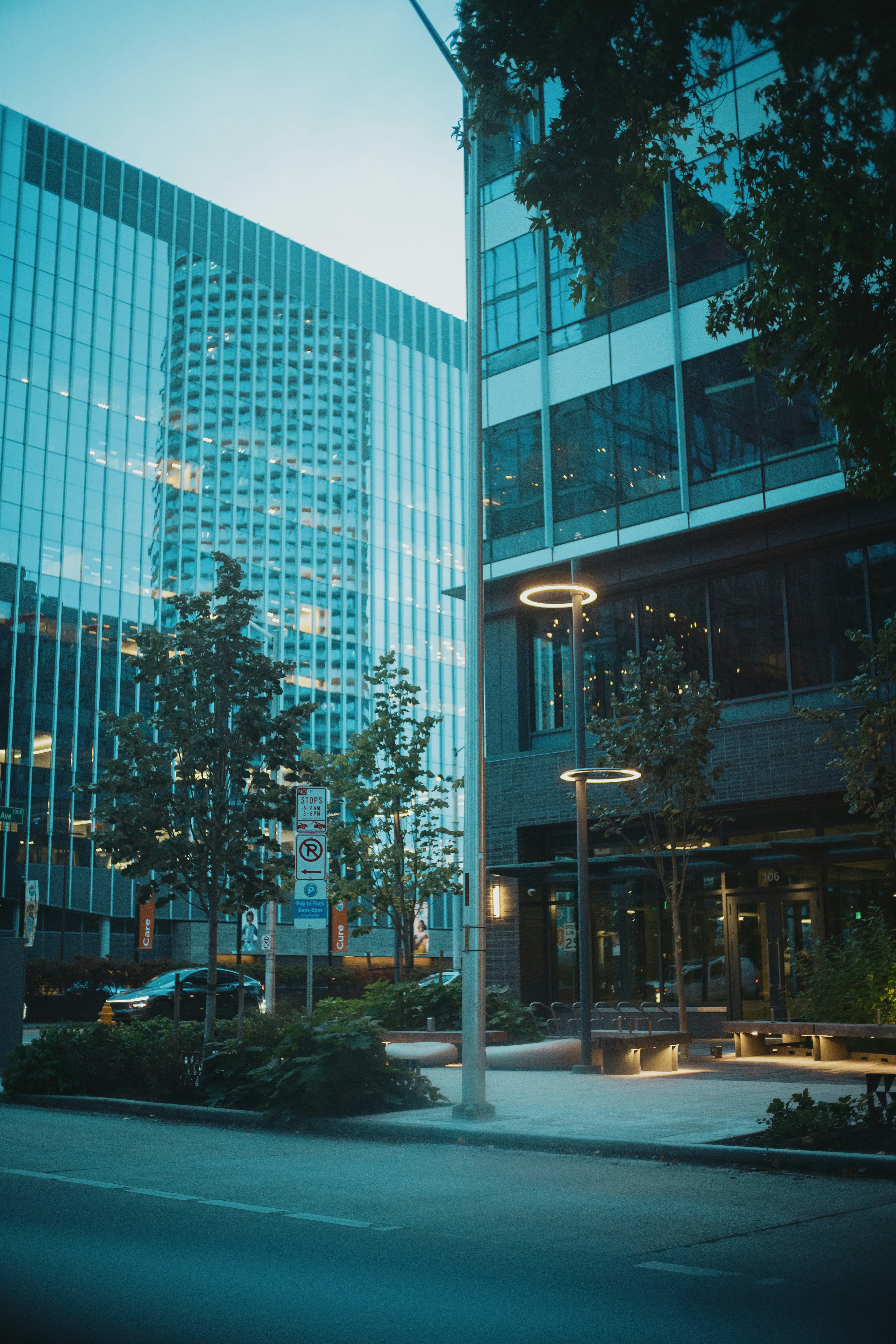 City Glass Reflections: A Quiet Street in Blue Hour