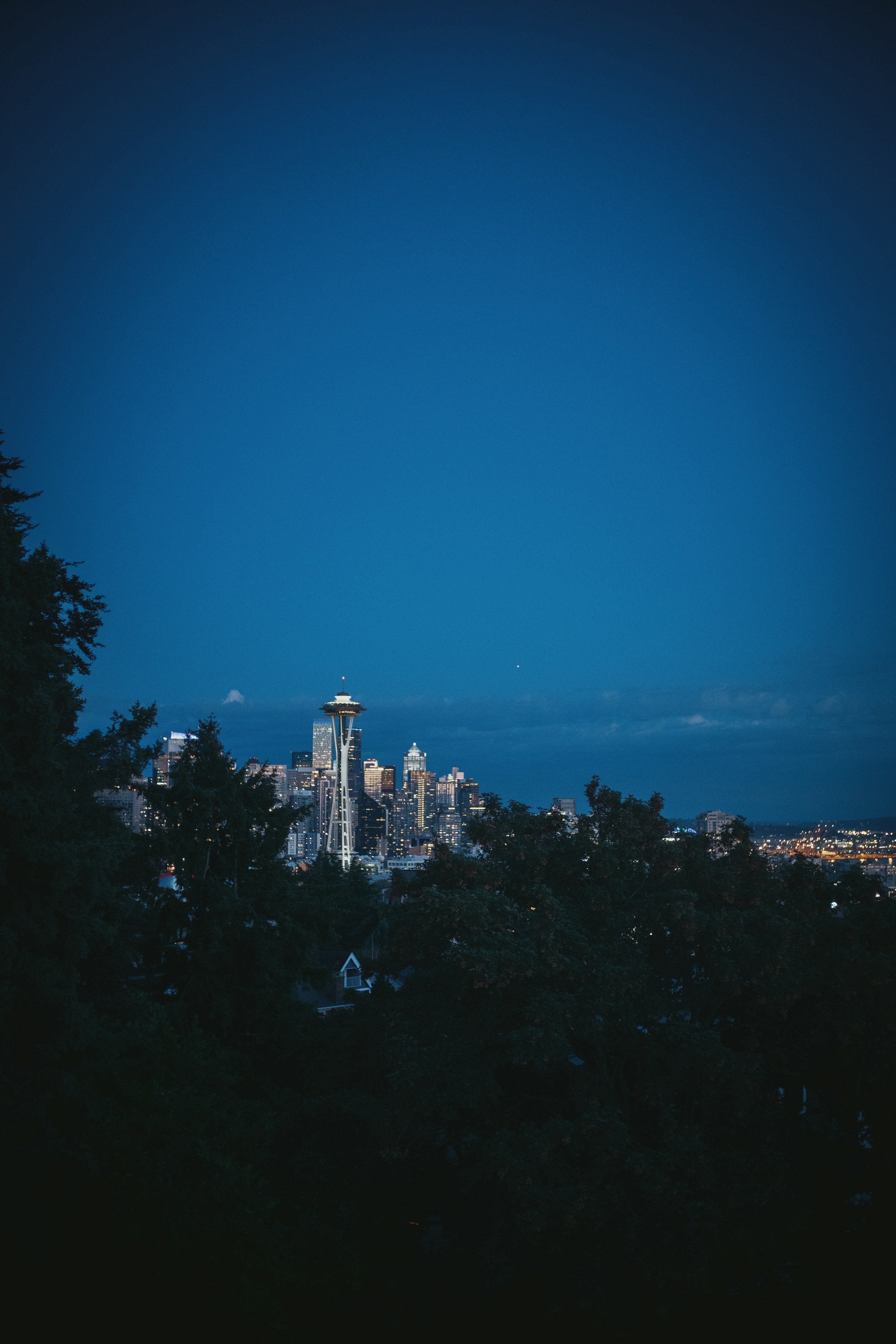 City Skyline Emerges Through Nightfall