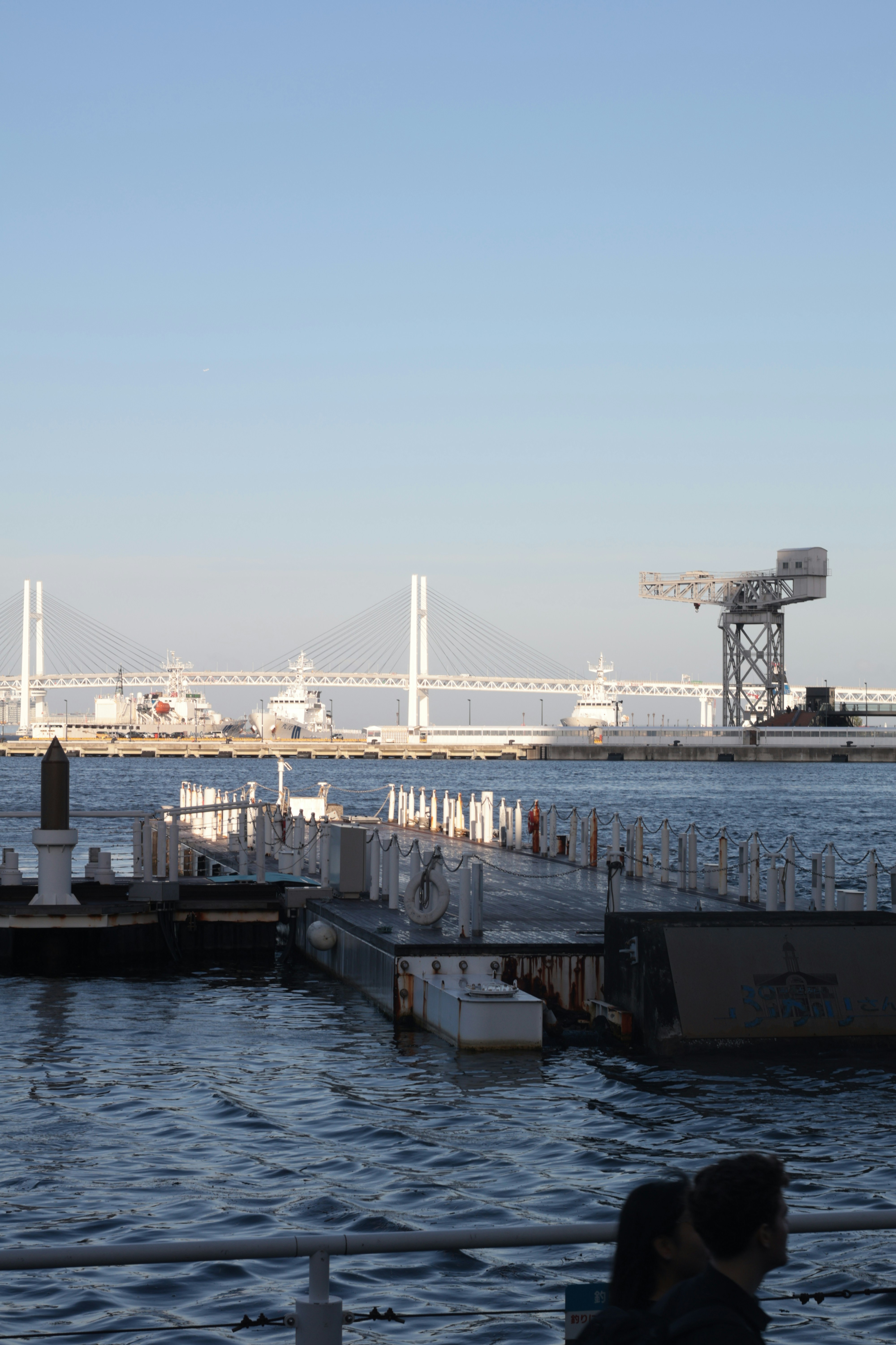 Harbor Silhouette: A Quiet Moment by the Pier