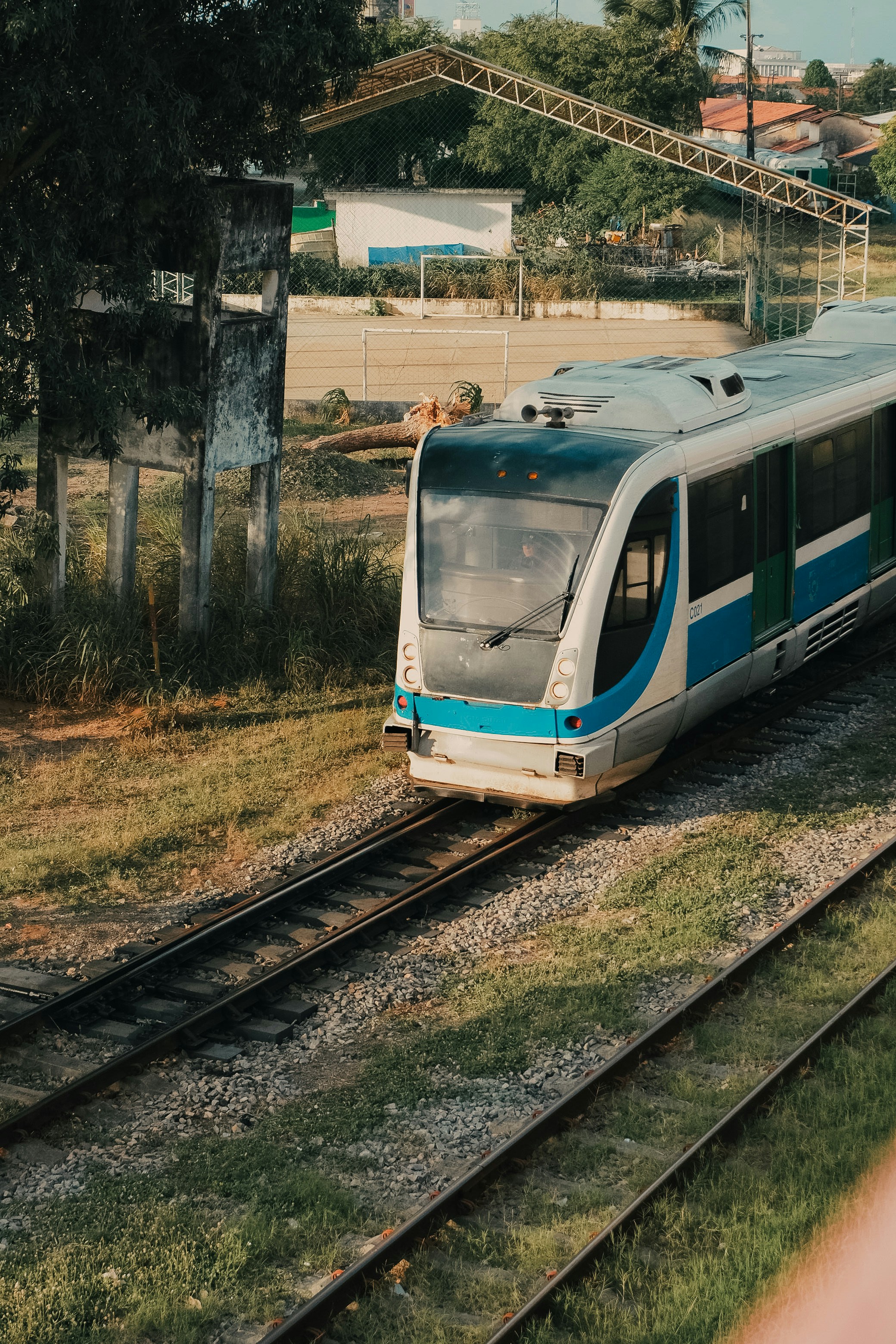 Front-Car Glide: Blue-and-White Train Races Along the Rails