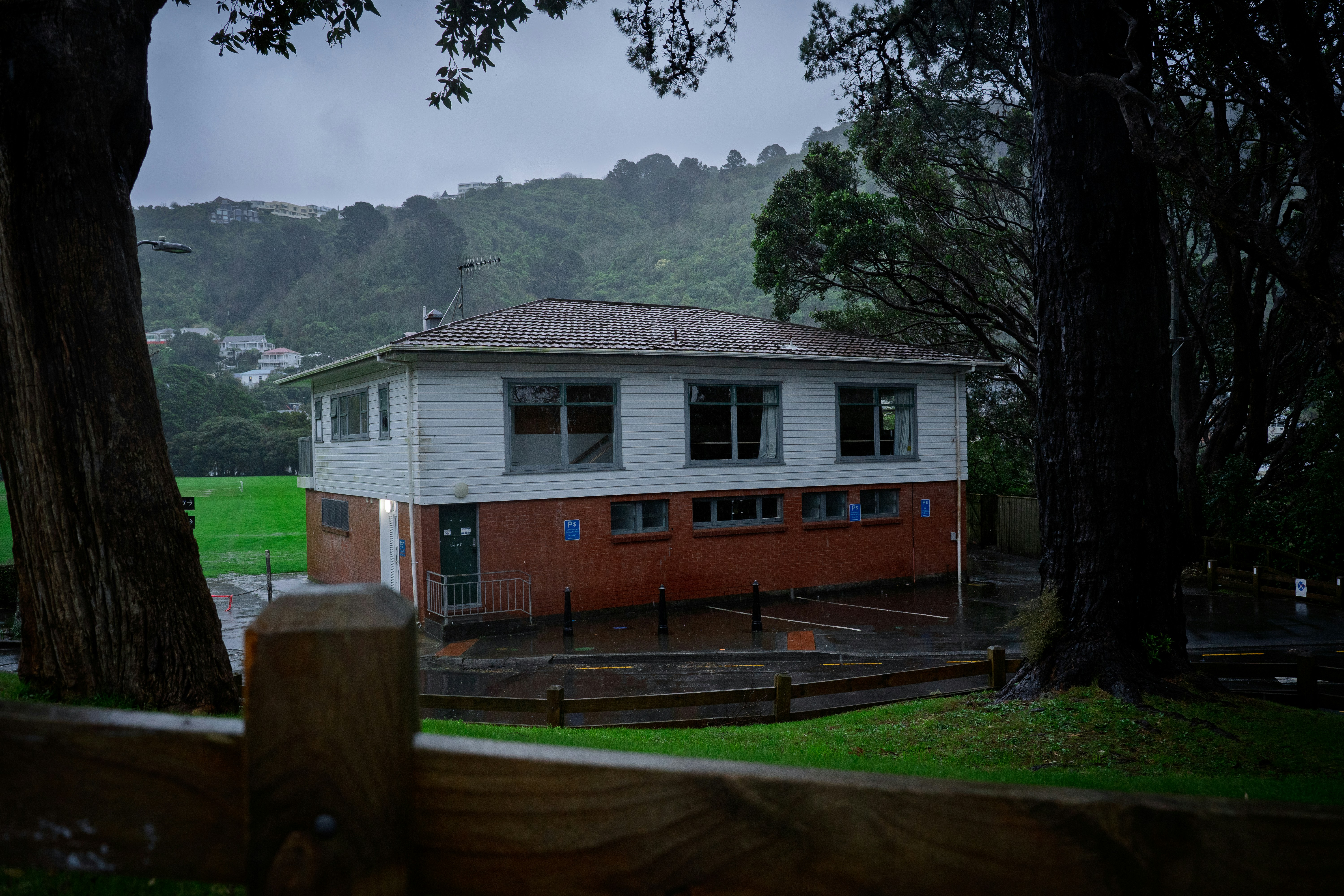 Midfield Studio: A Quiet Schoolhouse Framed by Branches and Hills