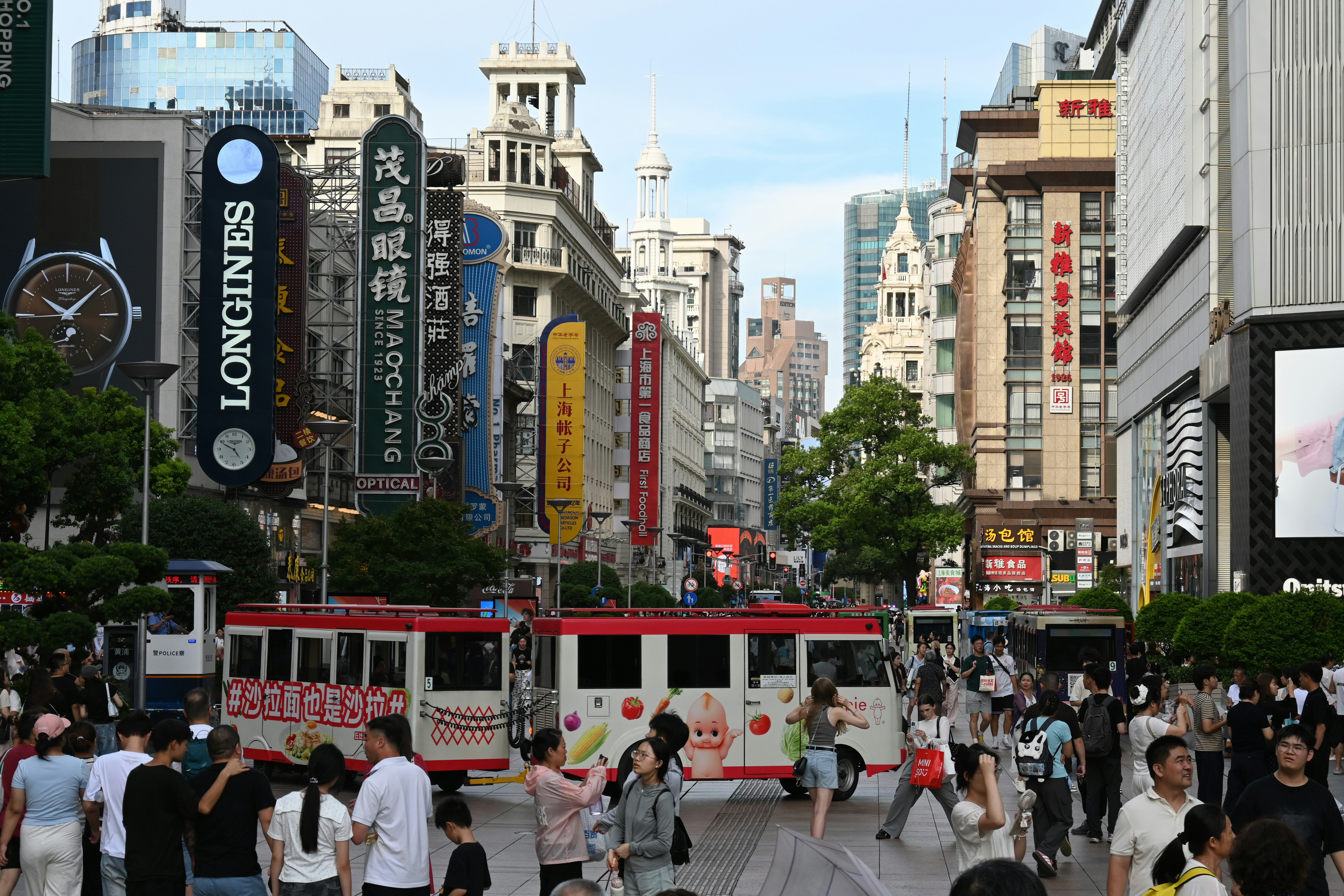 Crossroads of Neon and Pedestrian Life