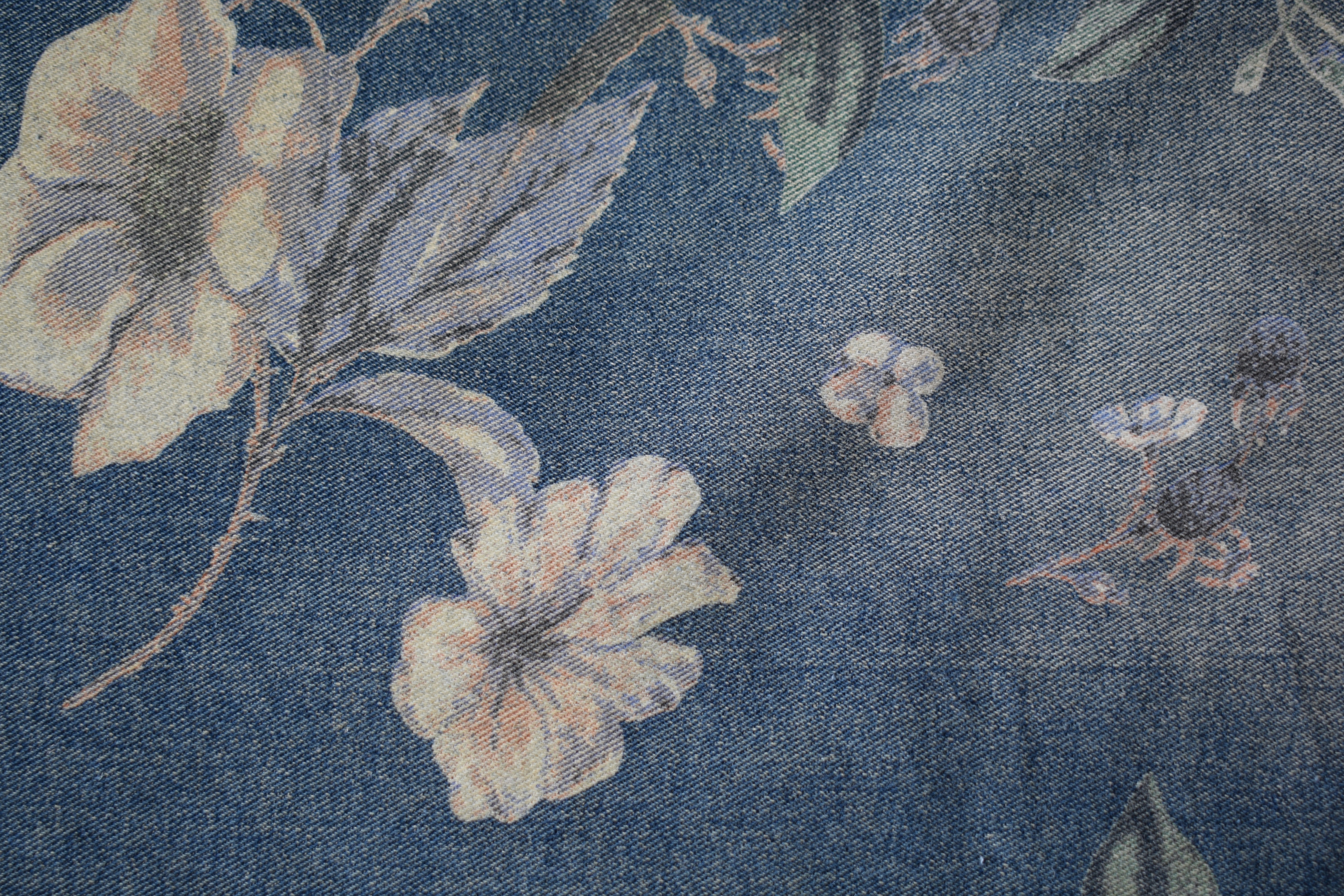 Frayed Floral Textile: Soft Peach Flowers on Denim