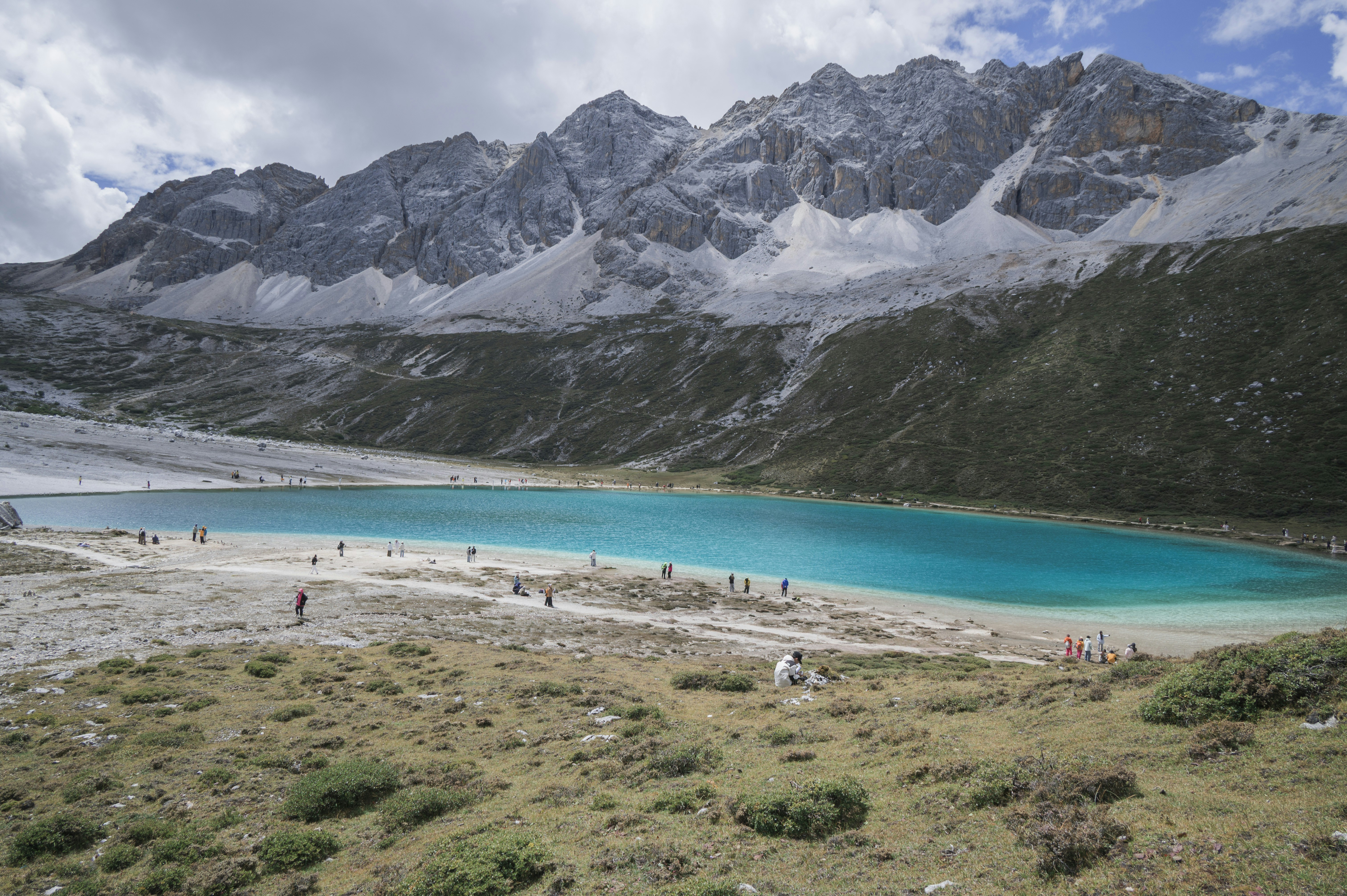 Turquoise Glacial Gamma: A Lakeside Basin Under Alpine Peaks