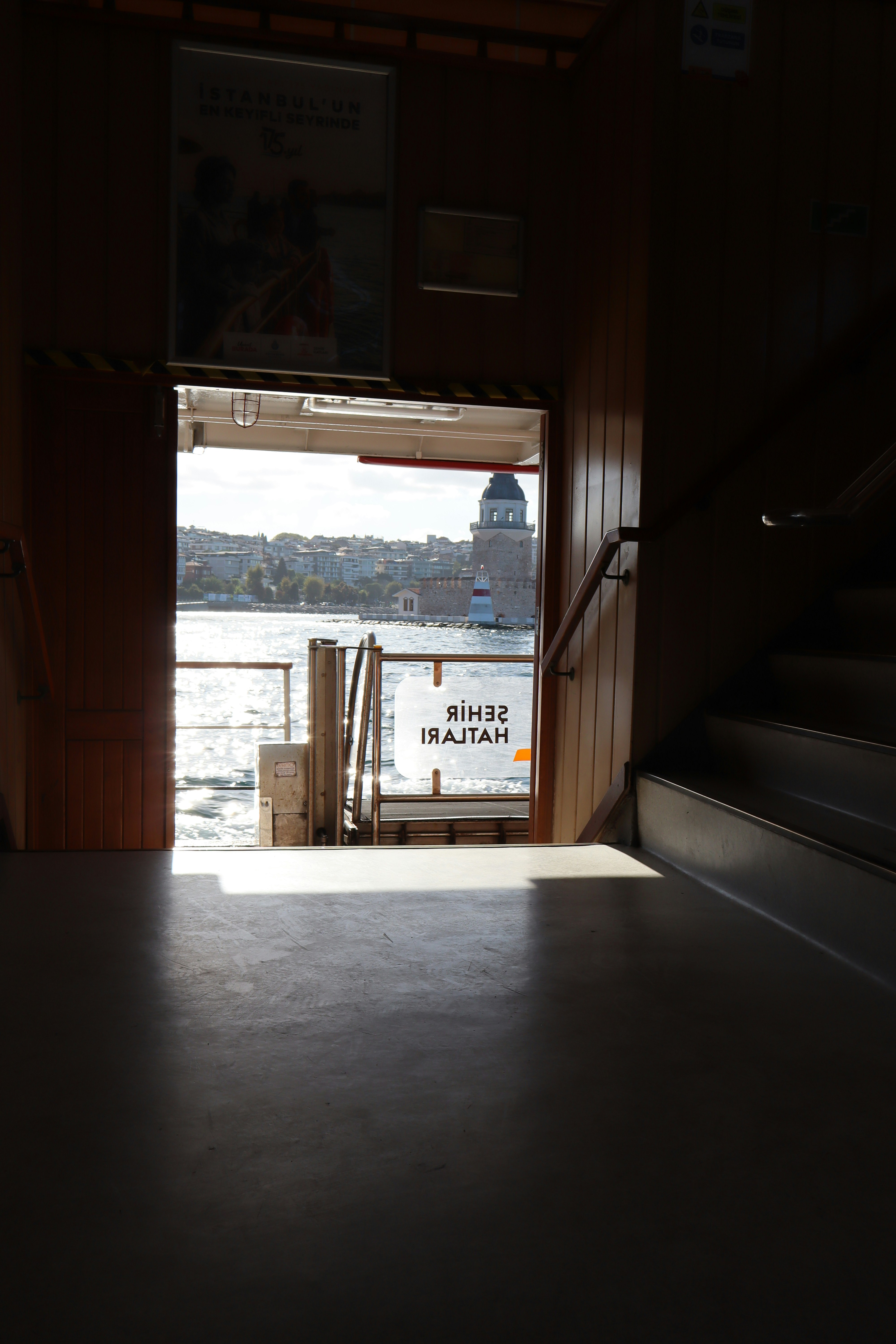 Port Entry: Light at the Waterfront Through a Wooden Threshold