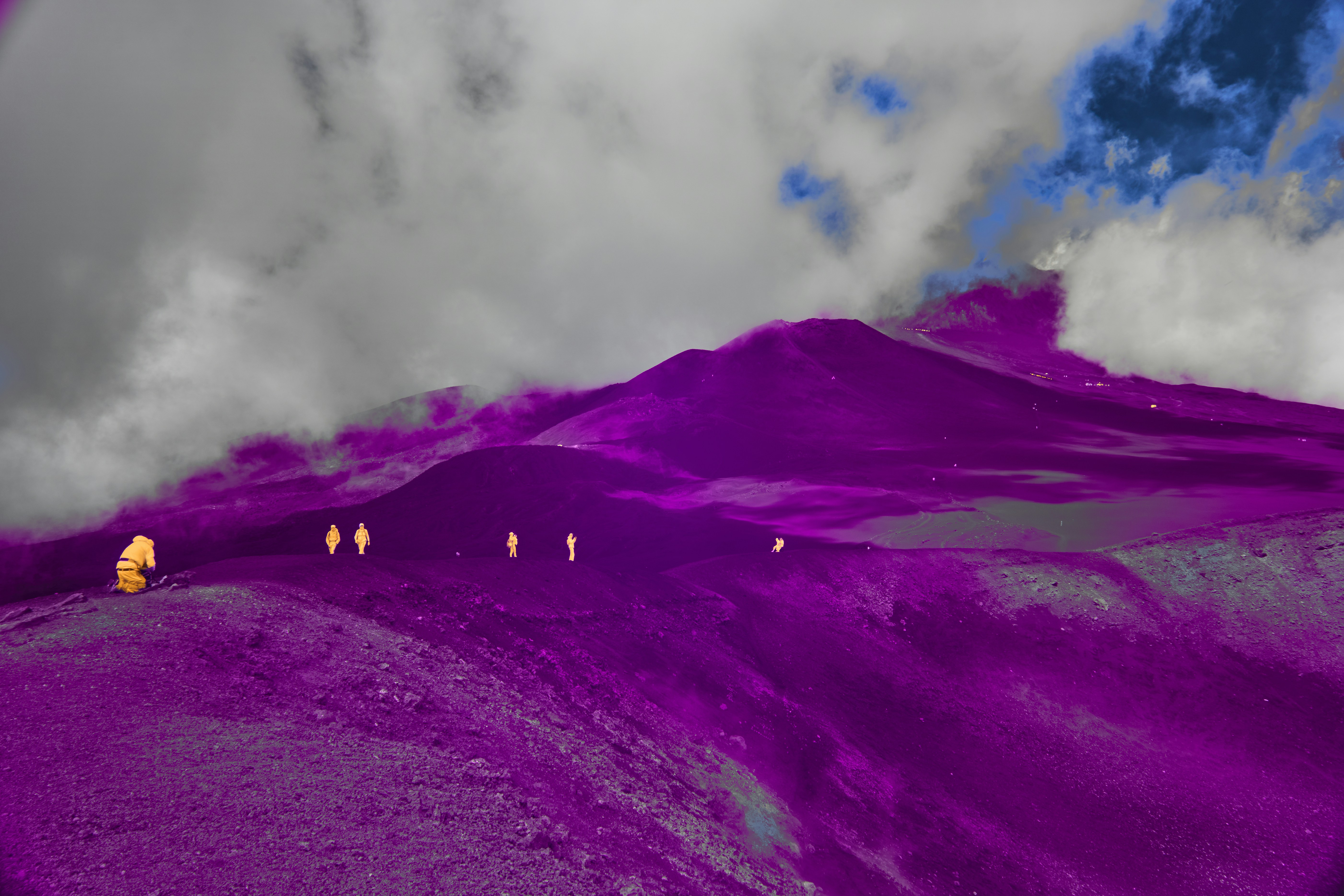 Infrared Trail: Lone Climbers Across a Violet Ridge