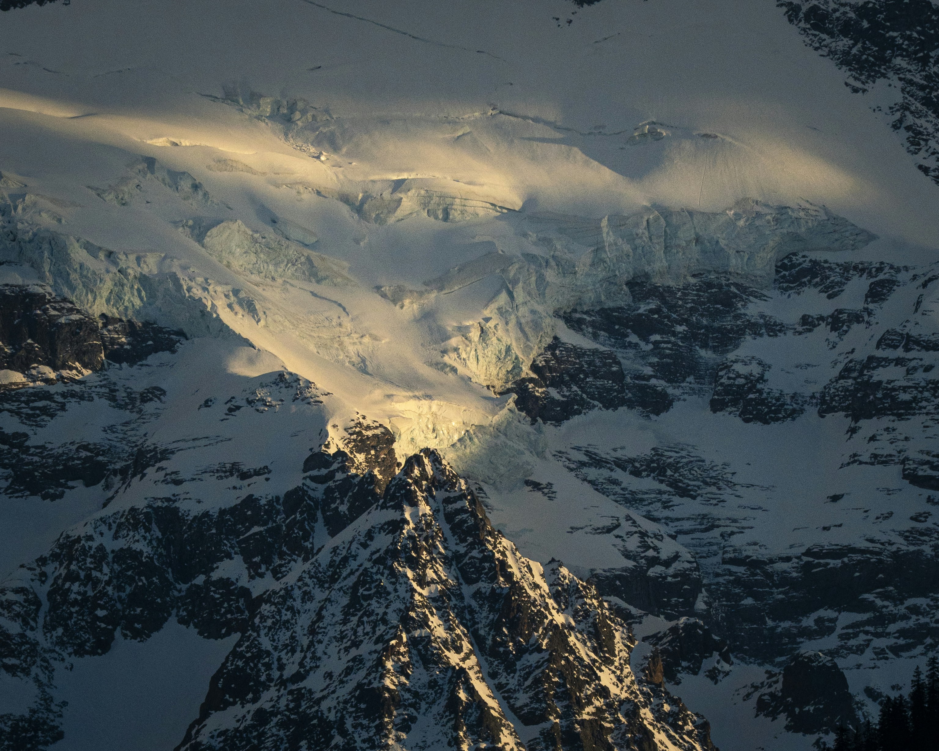 Sunlit Crest: A Mend of Ice and Shadow