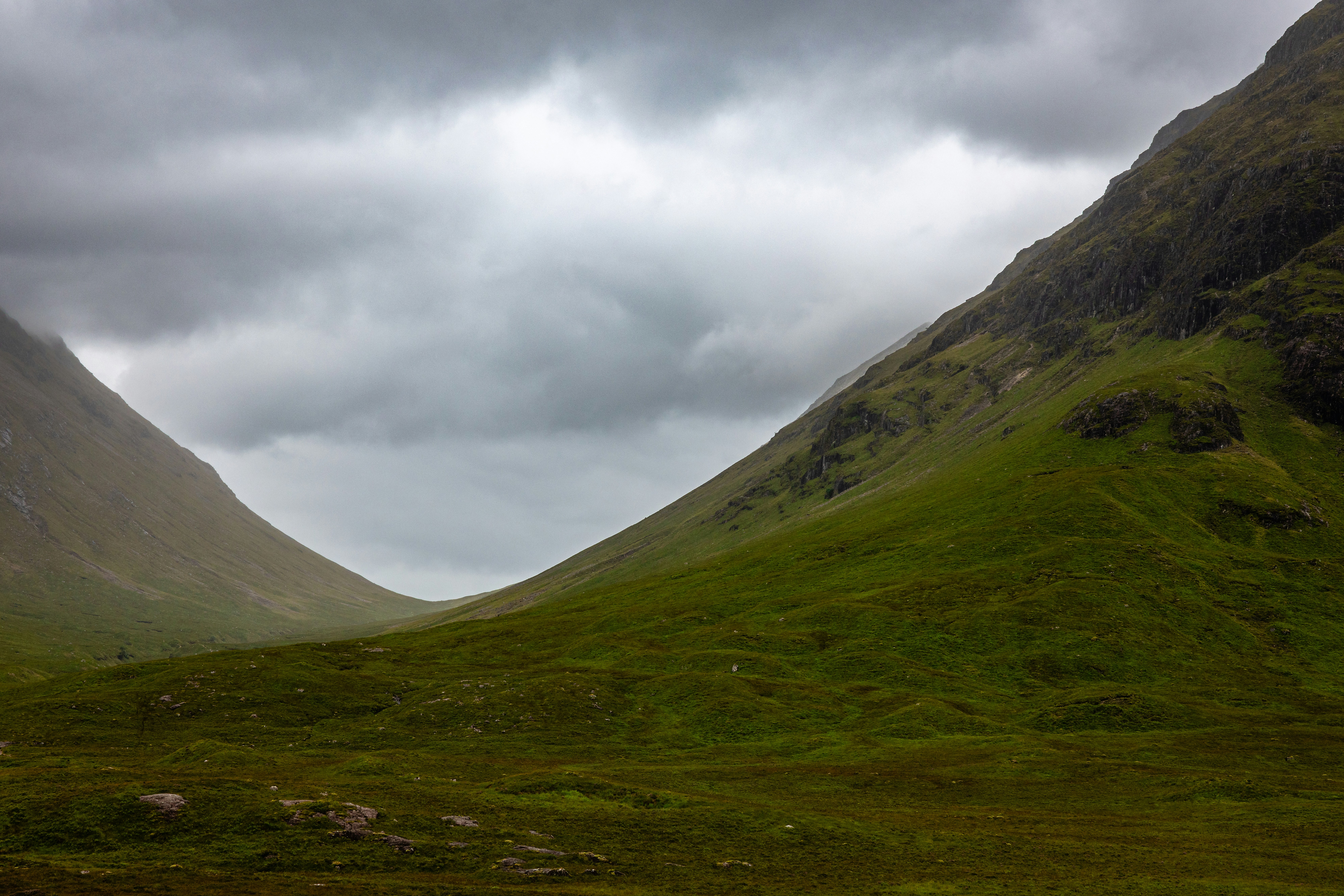 Valley V-Shape Under Overcast Ridge