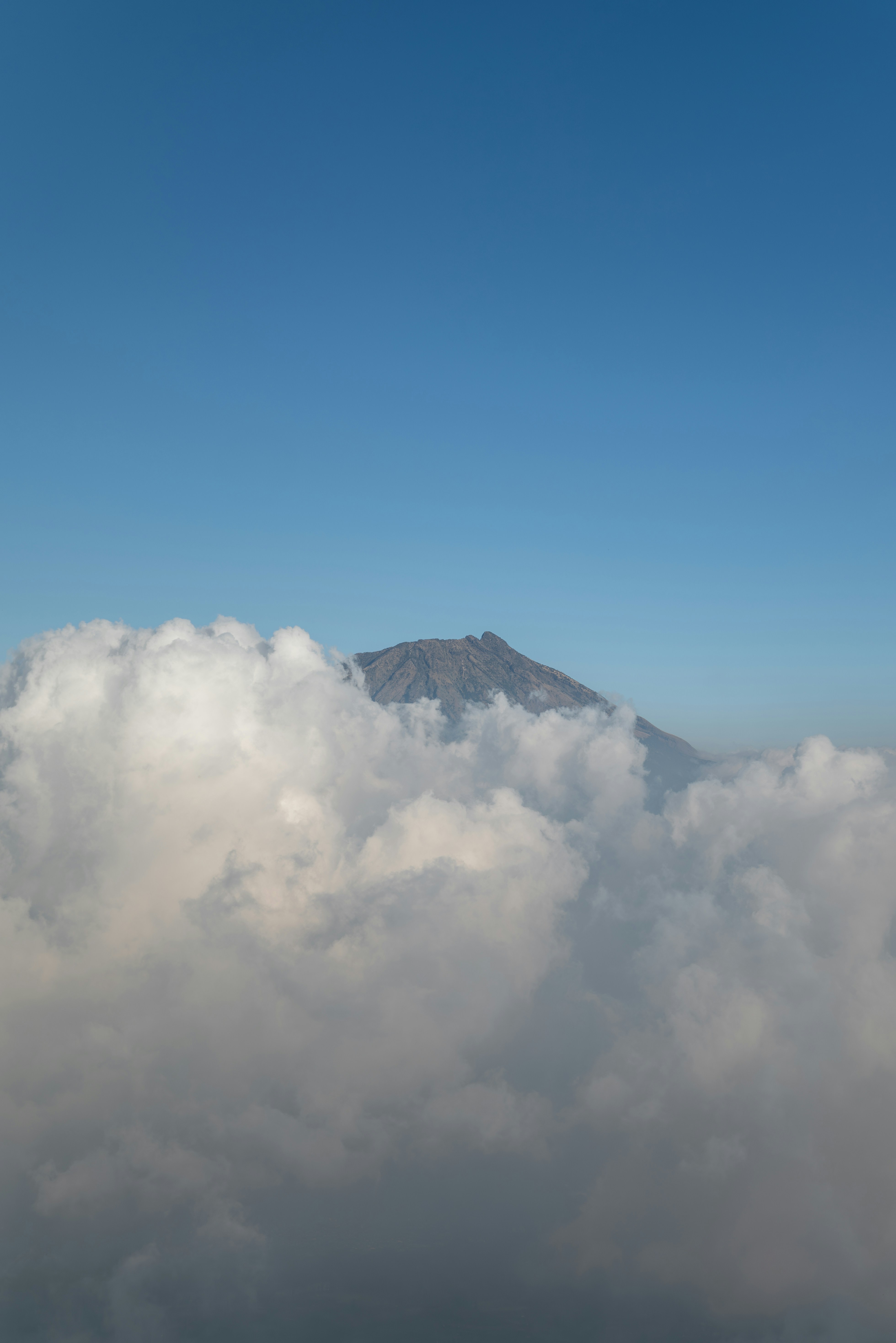 Cloud Crowned Peak: Mountain Rising Through the Sea of Clouds