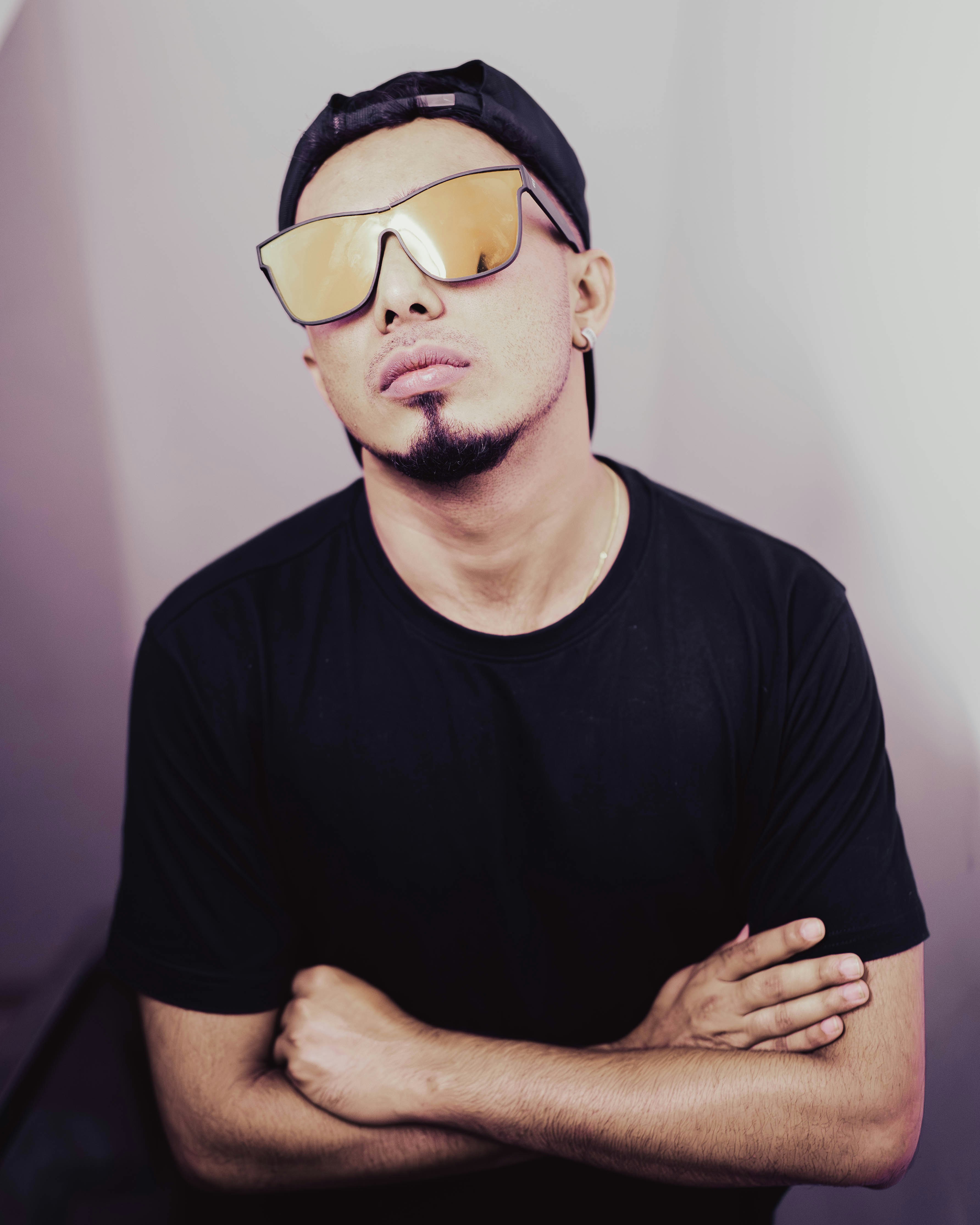 Shadowed Cool: A Confident Portrait in Neon Hue