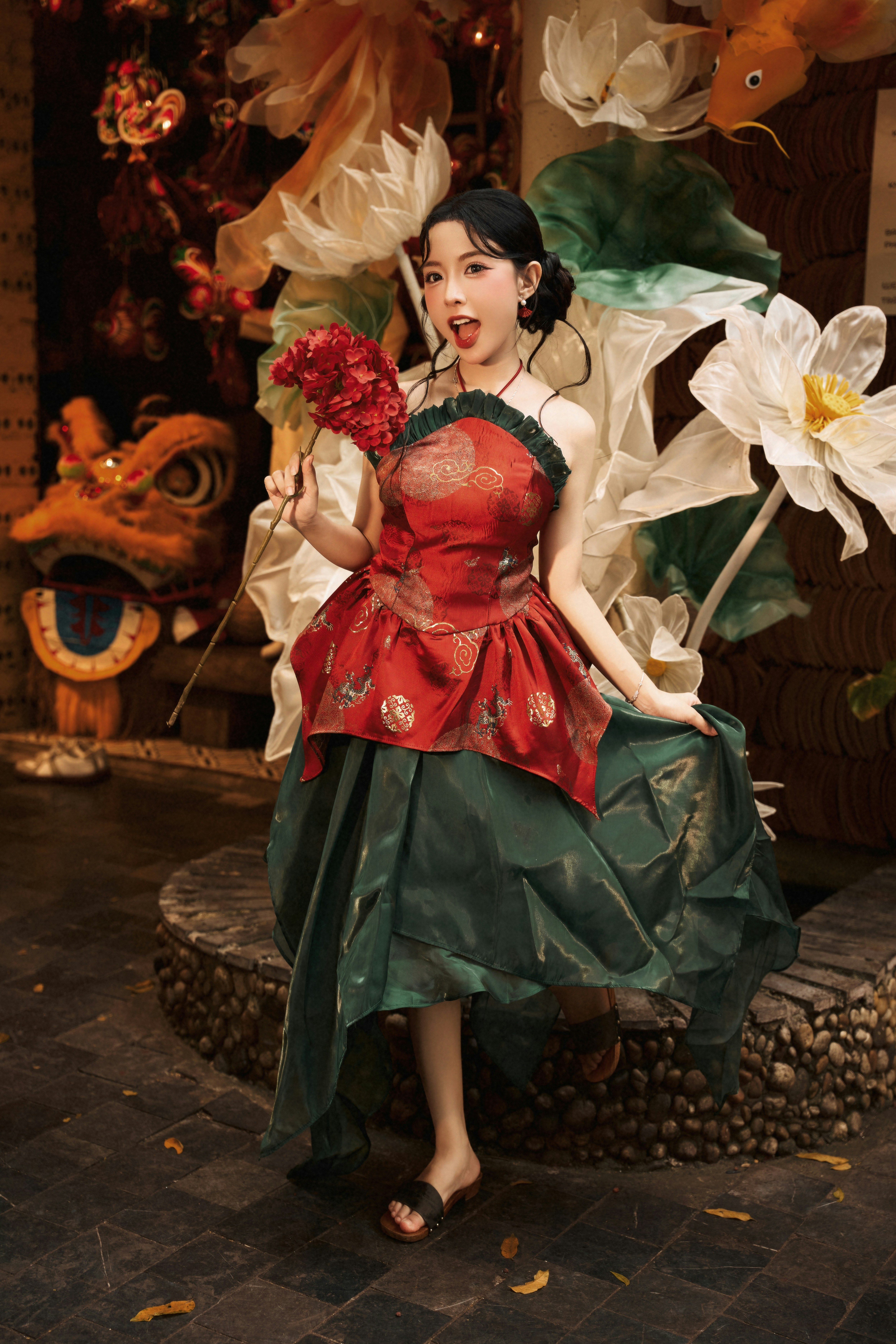 Embroidered Red and Green Ballgown in a Floral Stage Scene