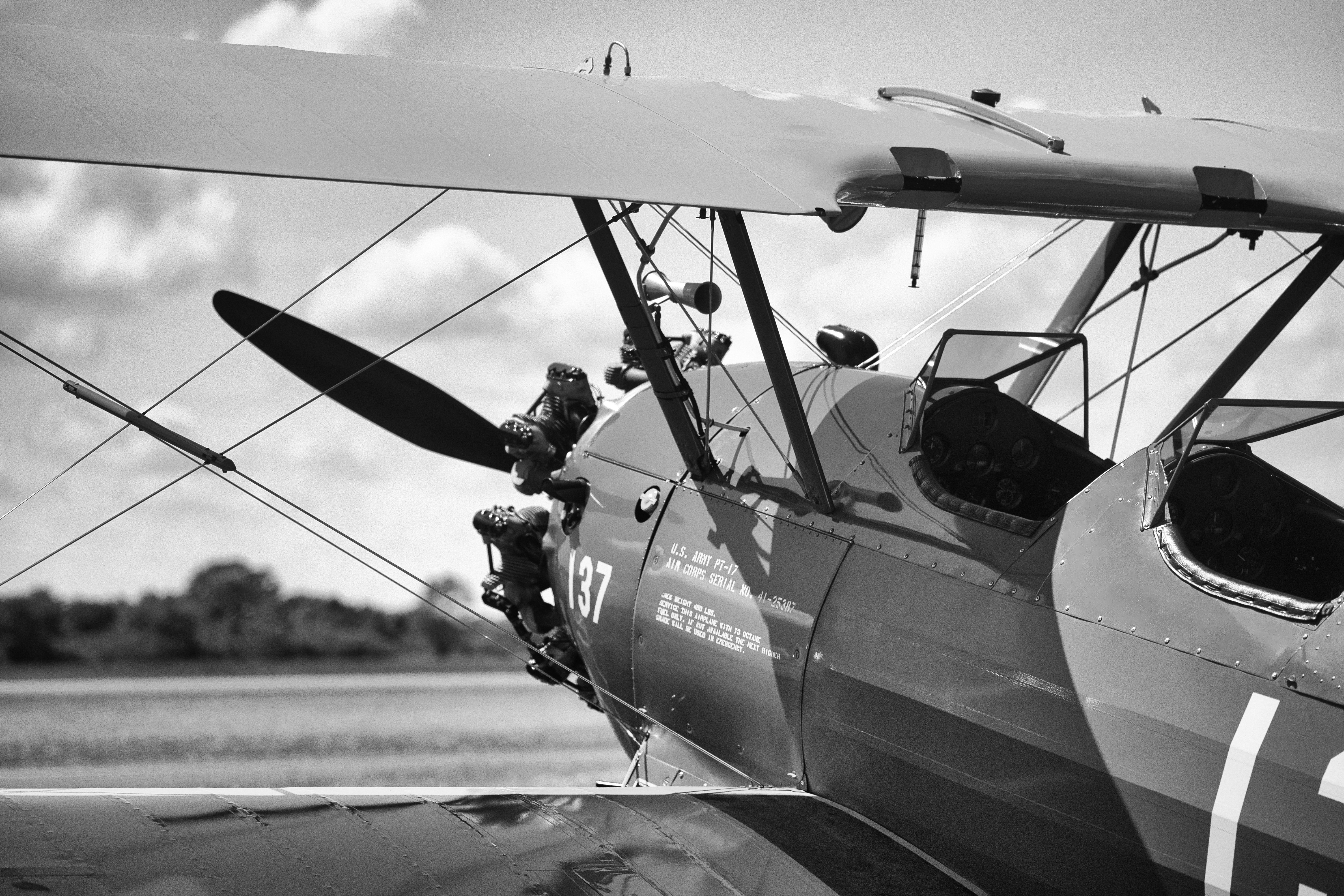Pinned by the Propeller: A Close Silent Moment Inside a Biplane Cockpit