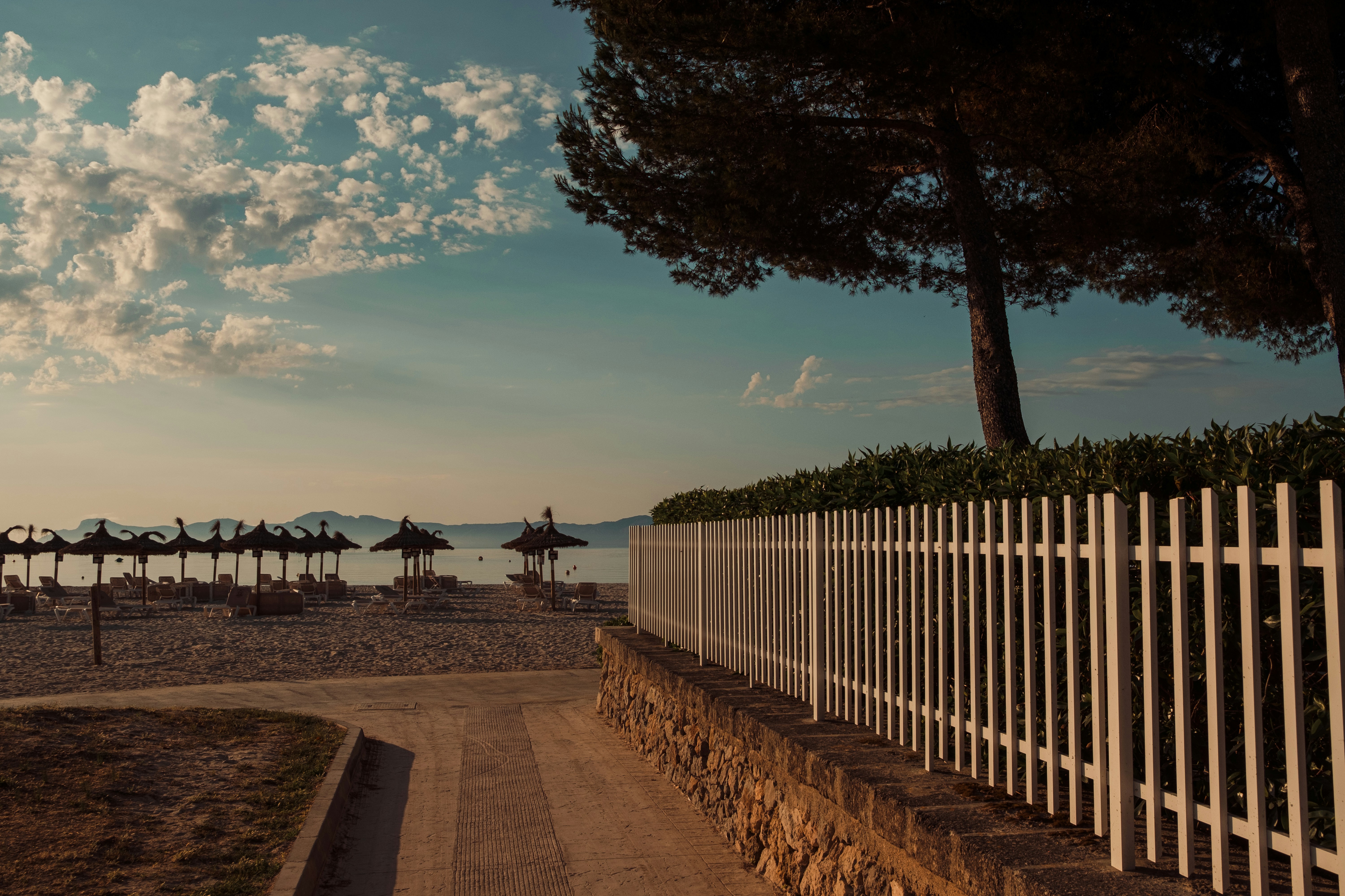 Sunlit Beach Gate: A Quiet Path Toward the Sea