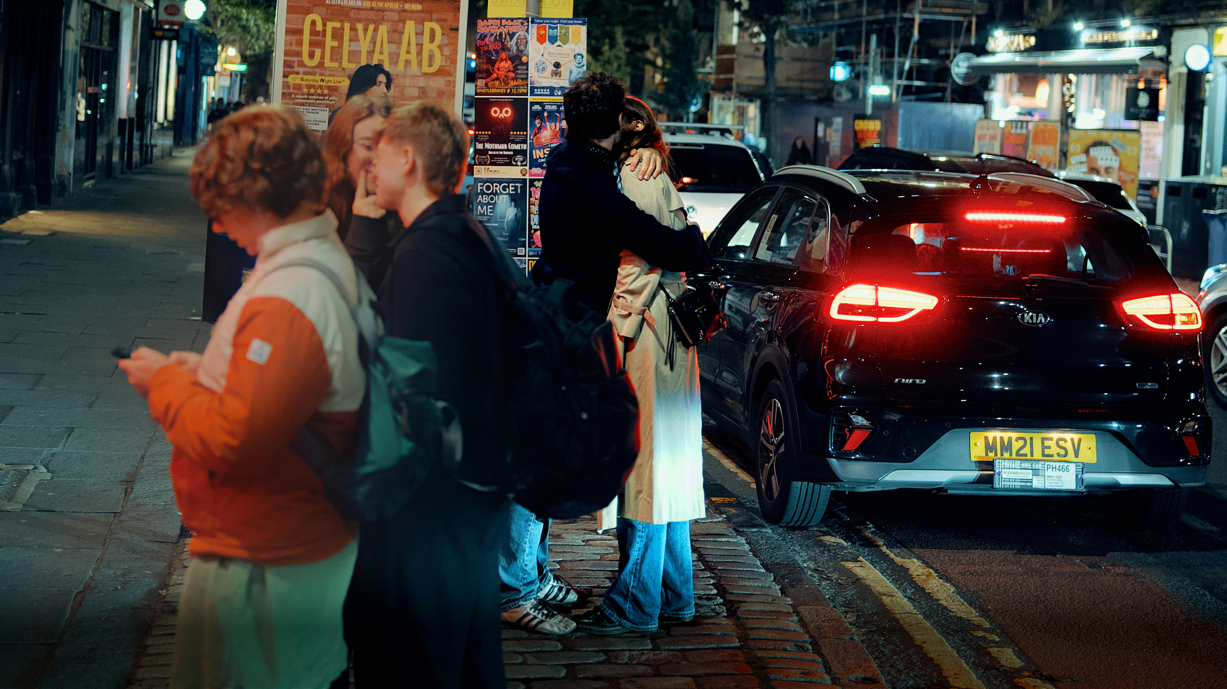 Midnight Crosswalk: Faces, Cars, and Neon in a City Pulse