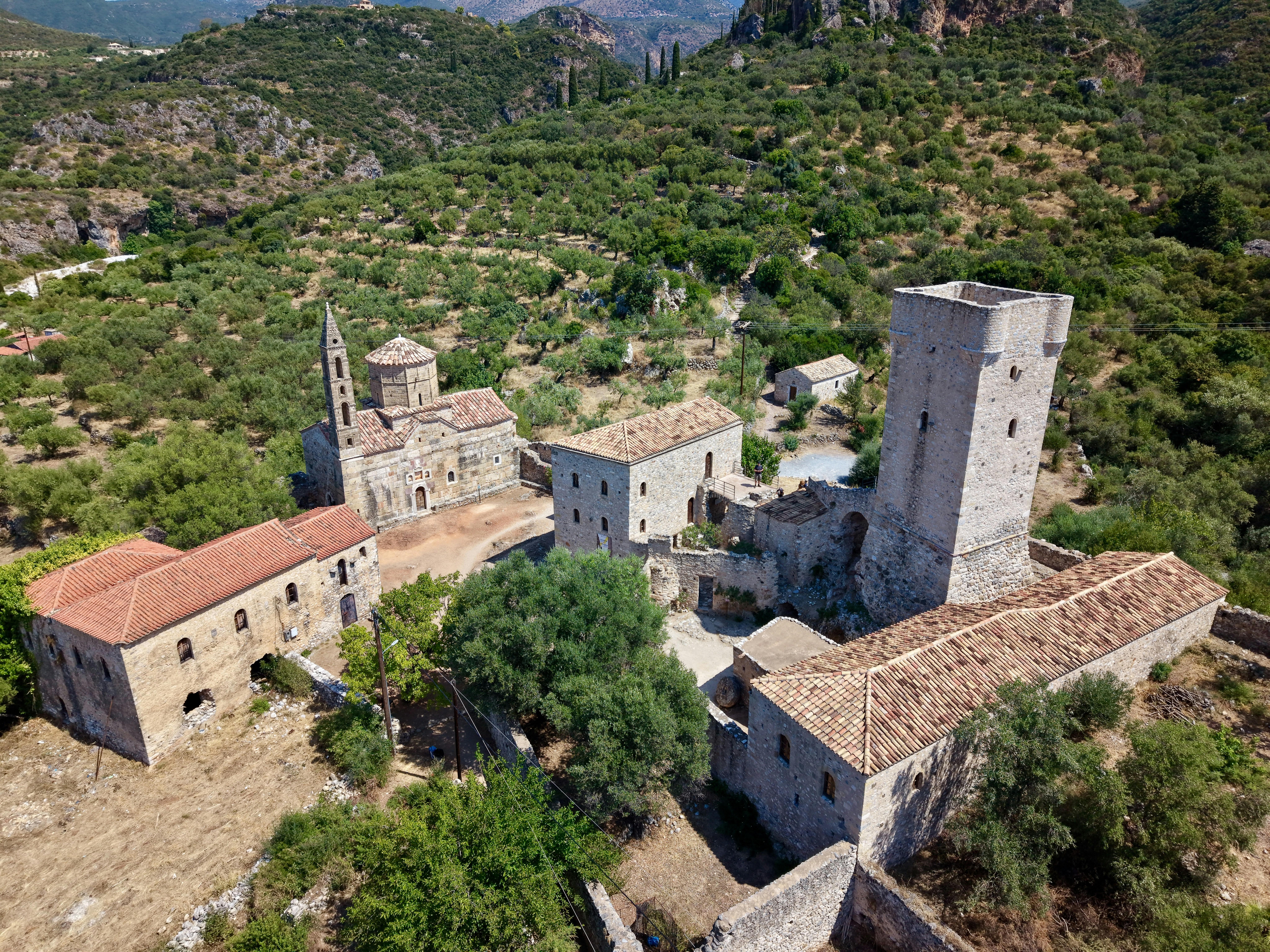 Medieval Hilltop Fortress Beneath a Sunlit Aerie
