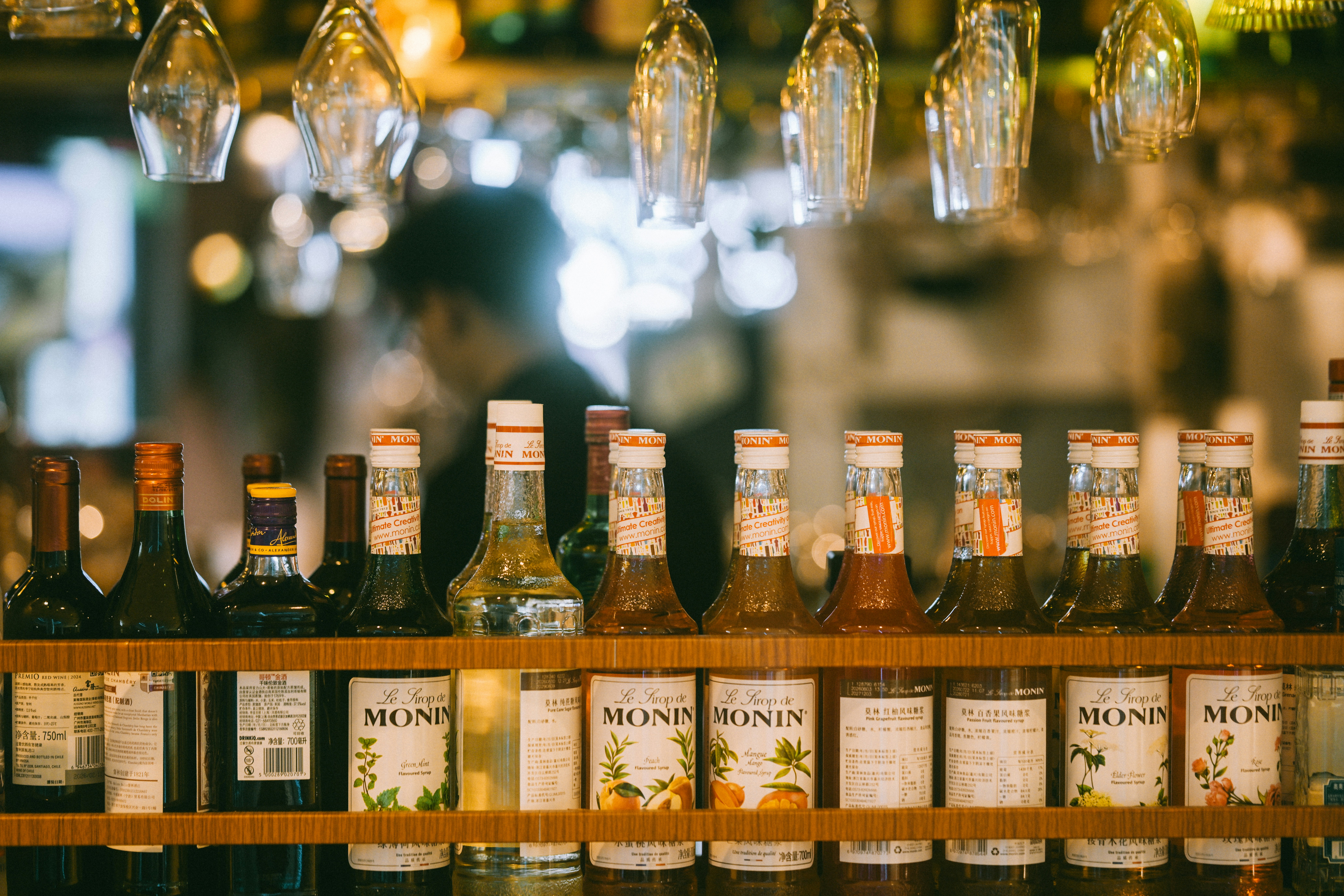 Amber Bottles on a Warm-Lit Bar