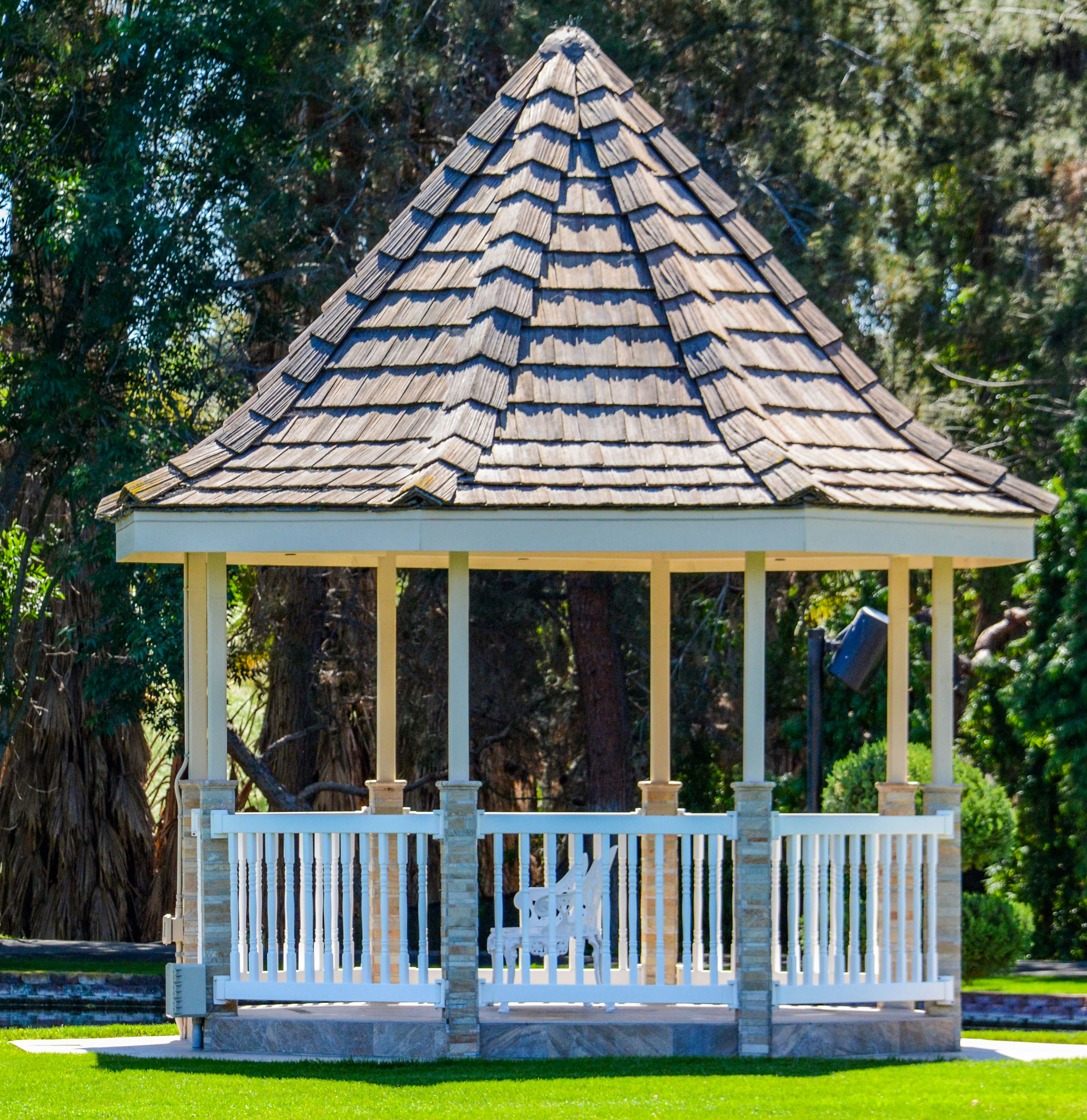 Sunlit Gazebo in a Quiet Park After Rains