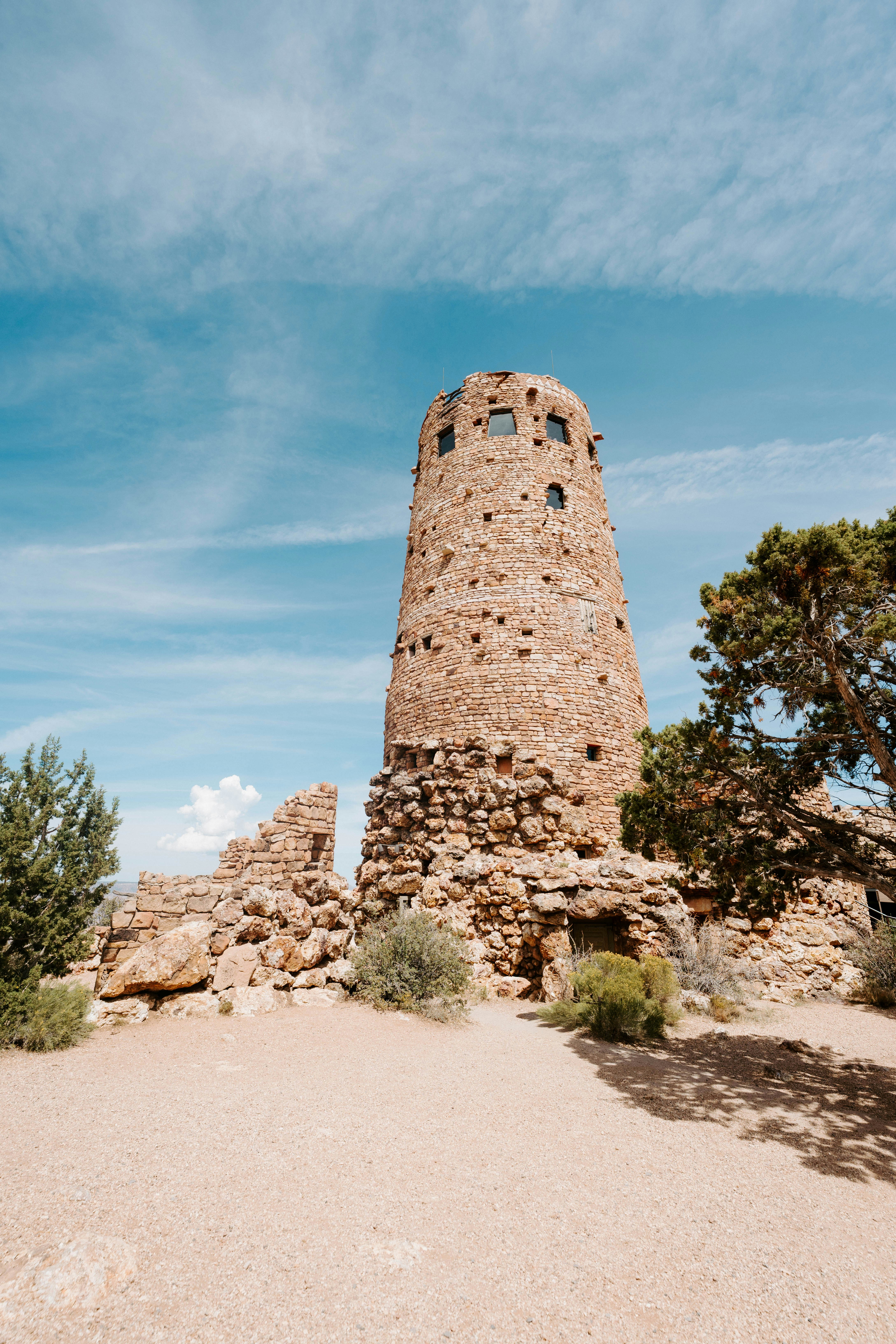 Ancient Cylindrical Tower Rising Above a Desert Ruin