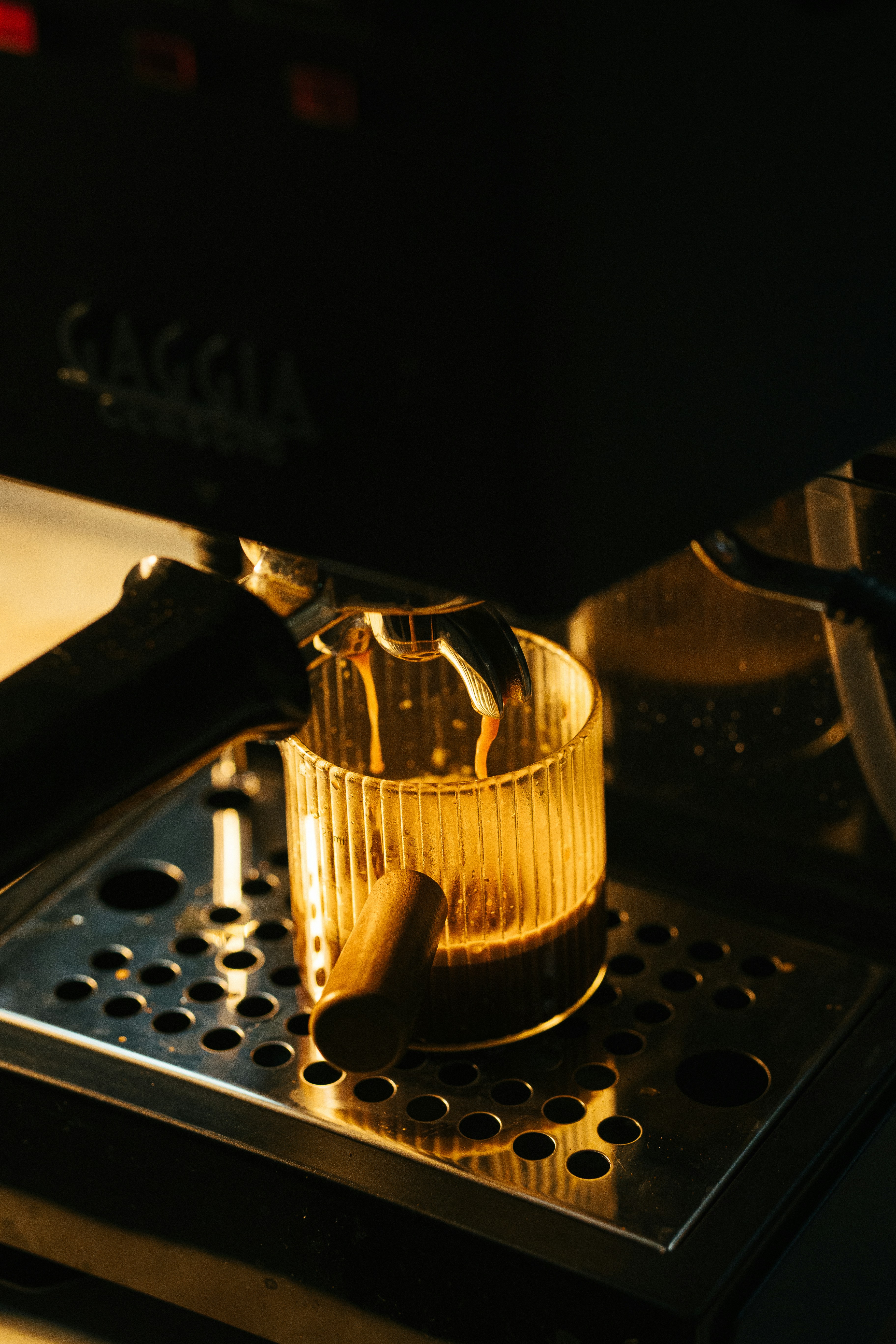 Golden Pour: A Quiet Moment Under Café Lights