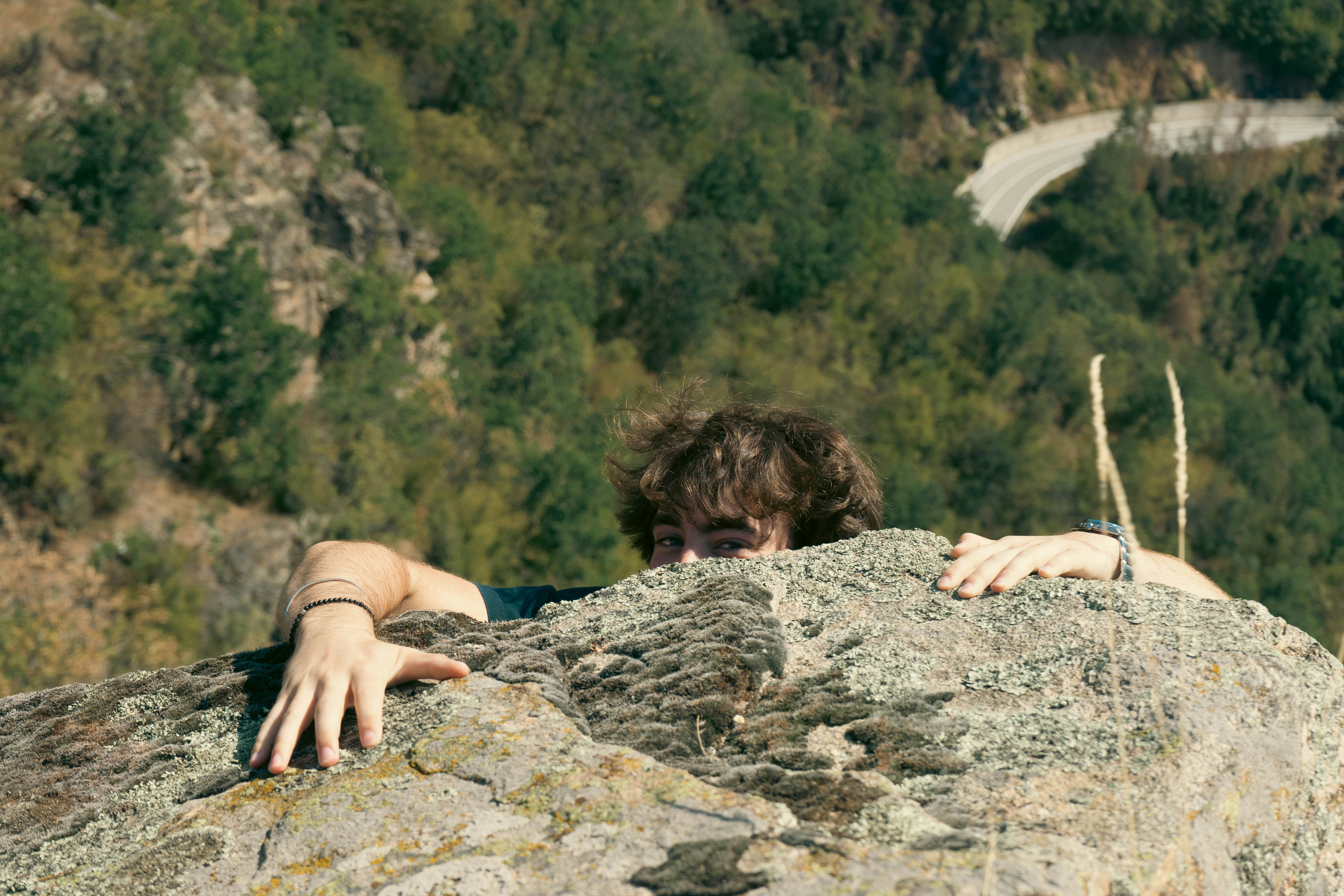 Over the Edge: A Shy Peak Amid Granite Grasp