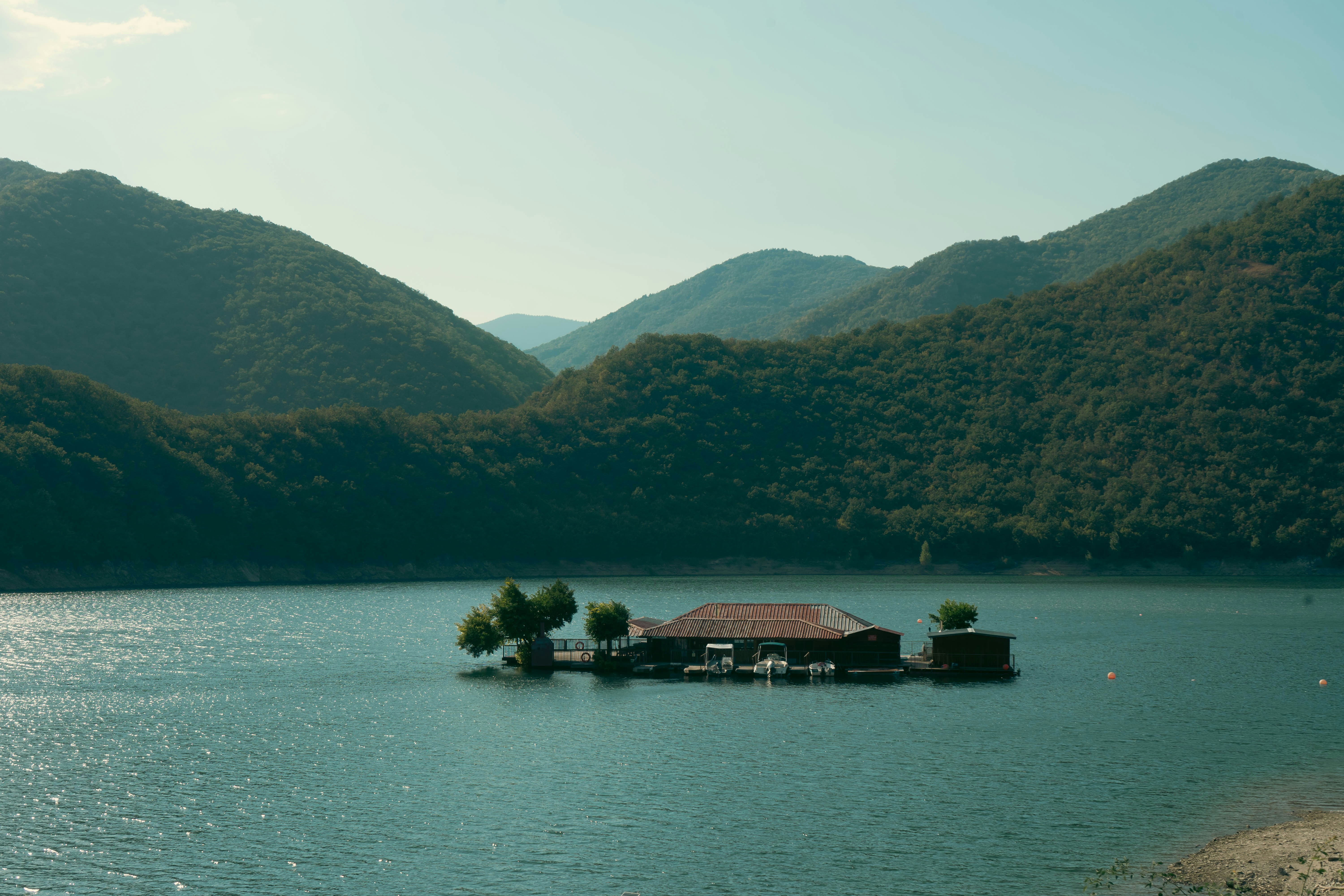 Alpine House Adrift on a Quiet Lake