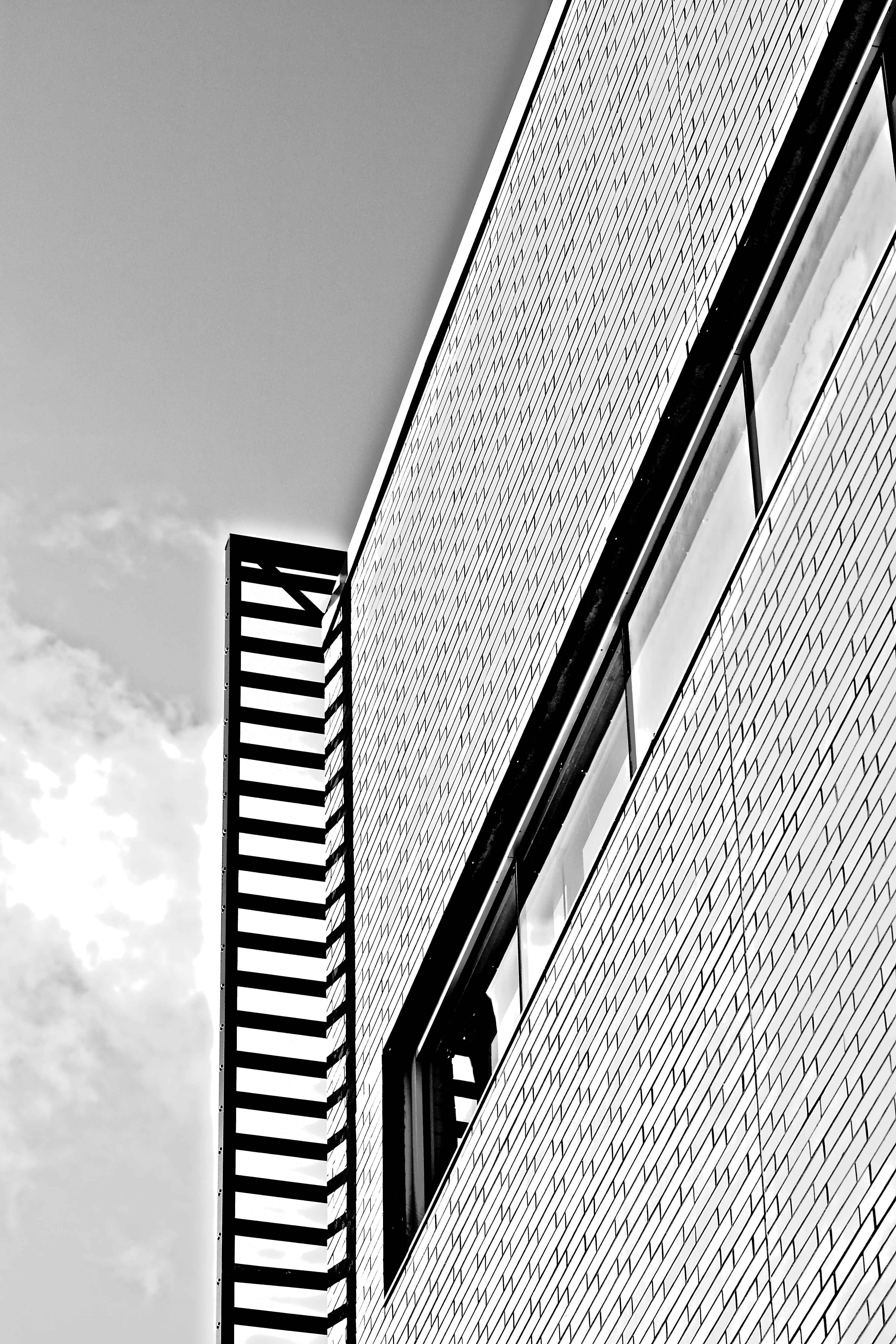 Monolithic Brick Facade Reaching Toward the Sky
