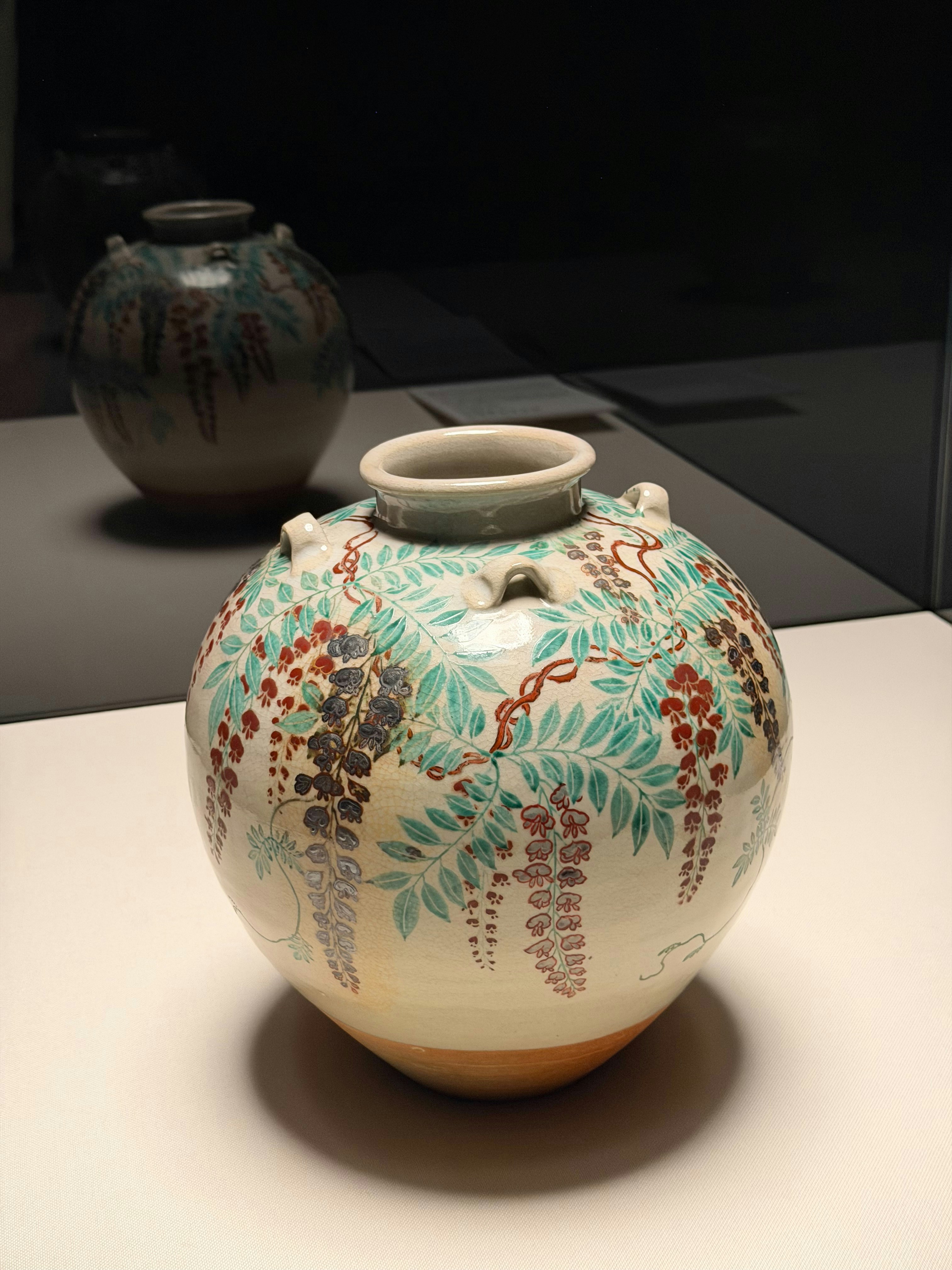 Hushed Studio Vase: Floral Glaze Under Spotlight