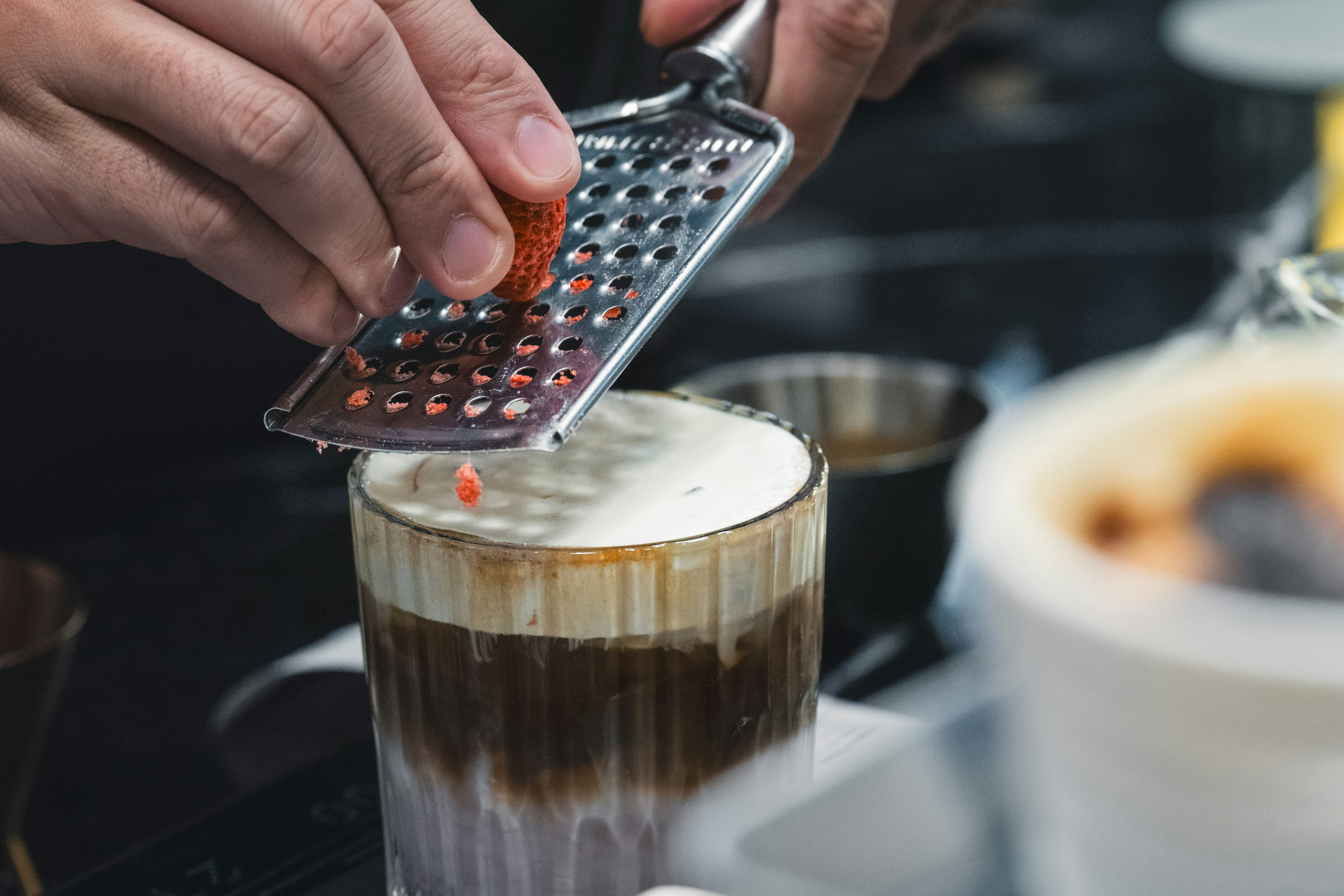 A Fine-Mist of Flavor: Grating Citrus Over a Layered Coffee Creation