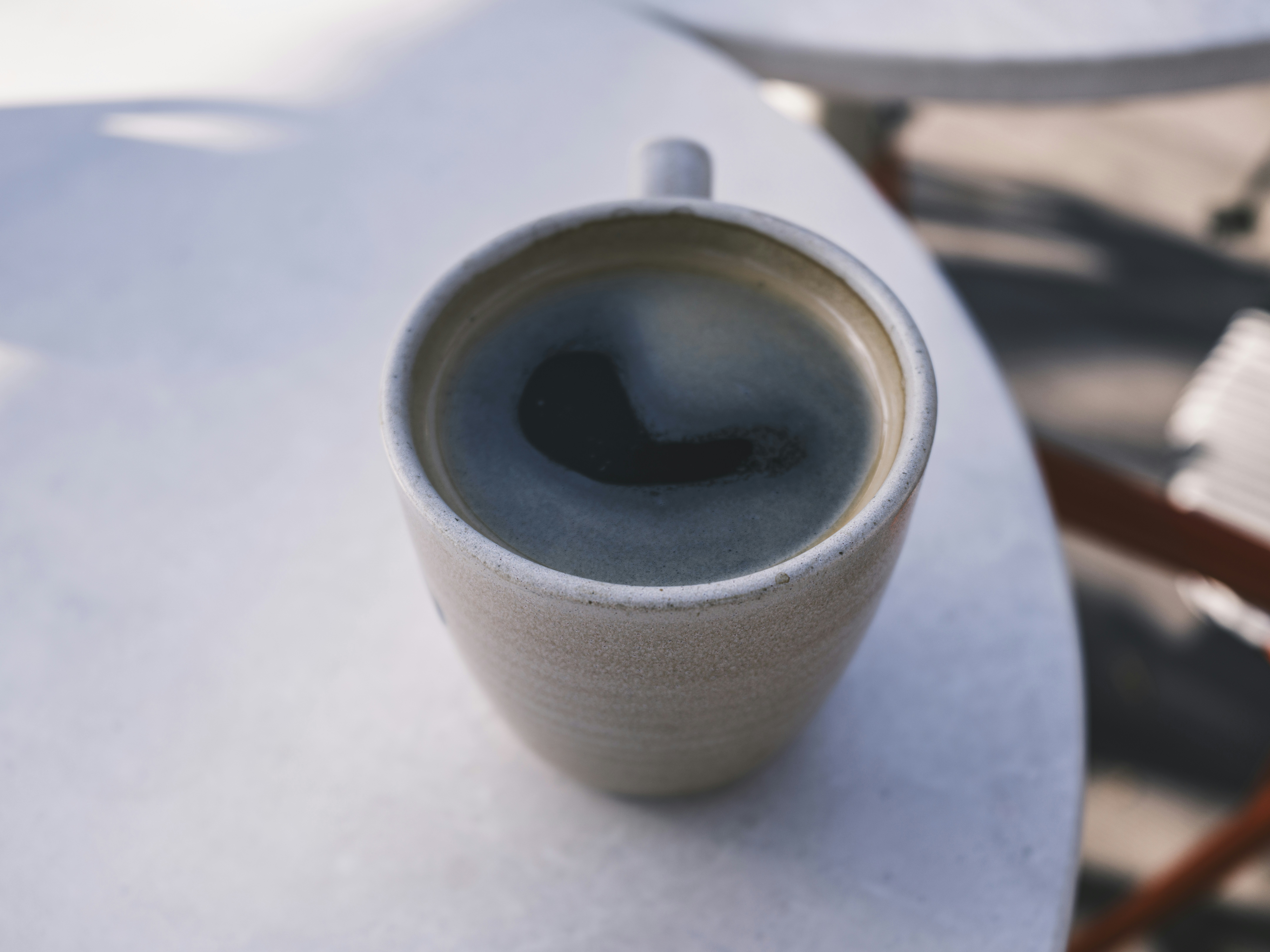 Minimalist Coffee Vessel: Quiet Morning on a Round Table