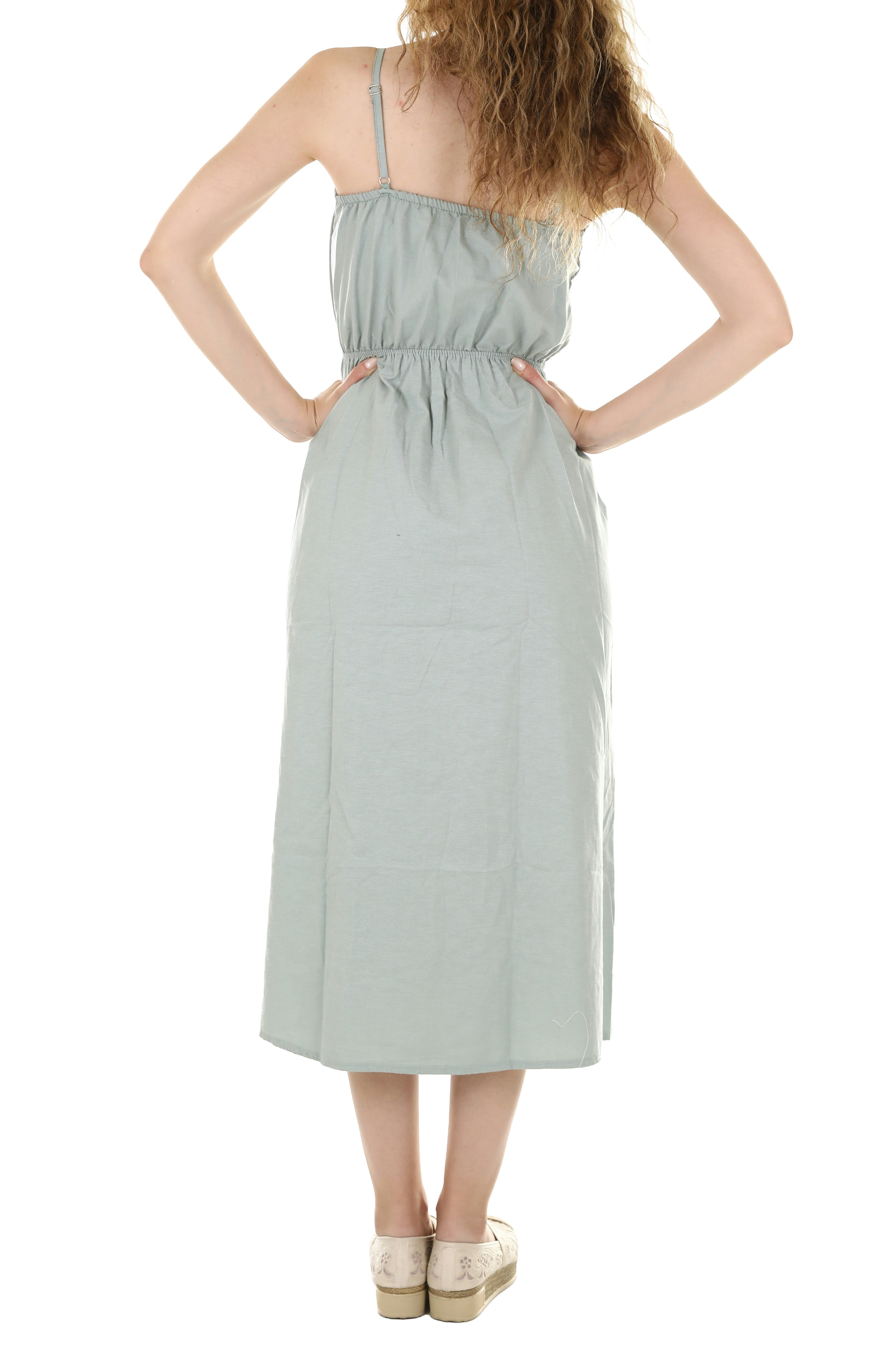 Back View in a Pale Blue Midi Dress