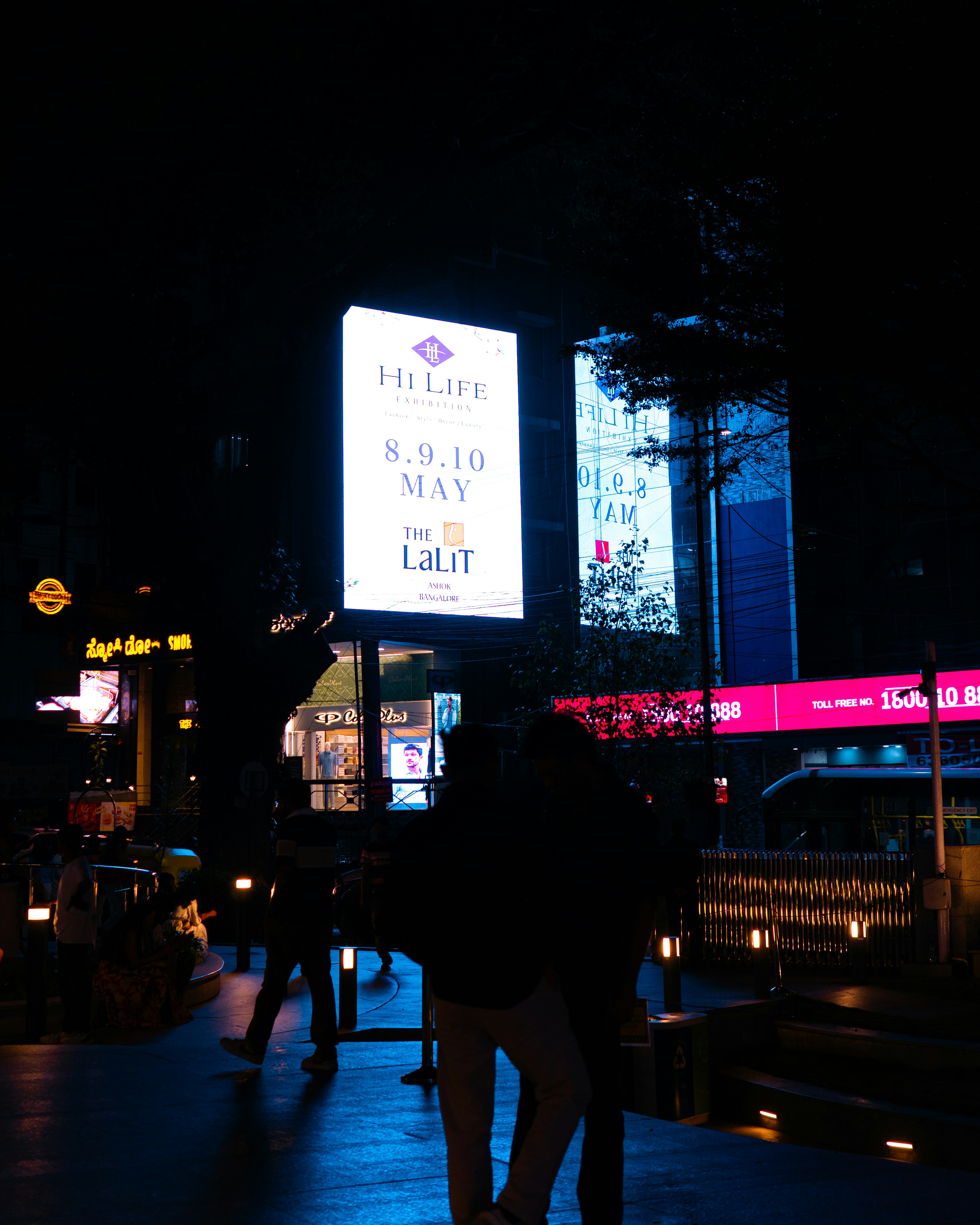 Neon Promenade: A Night at the Bright Billboard