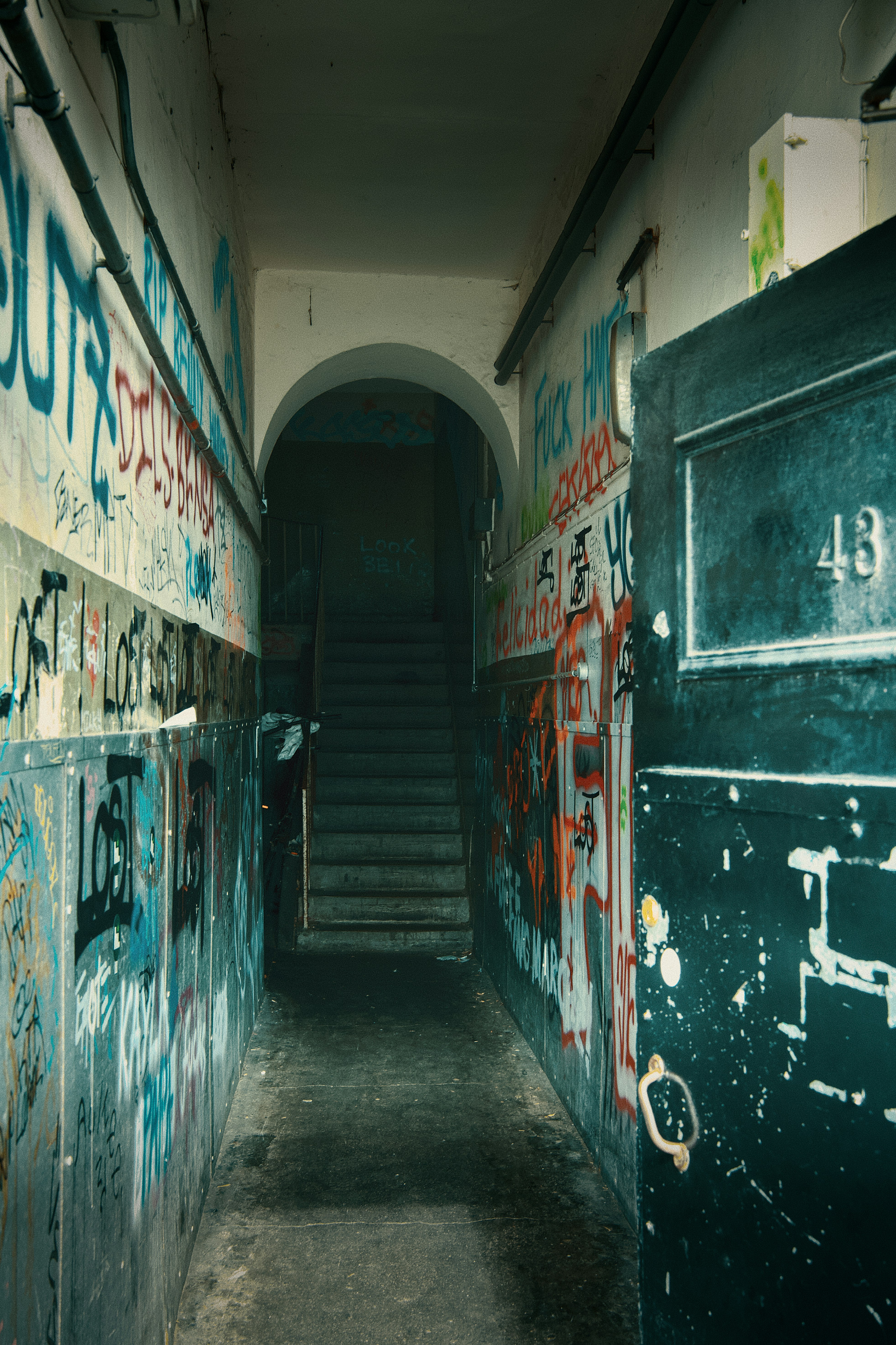 Graffiti Corridor to the Staircase Atlas