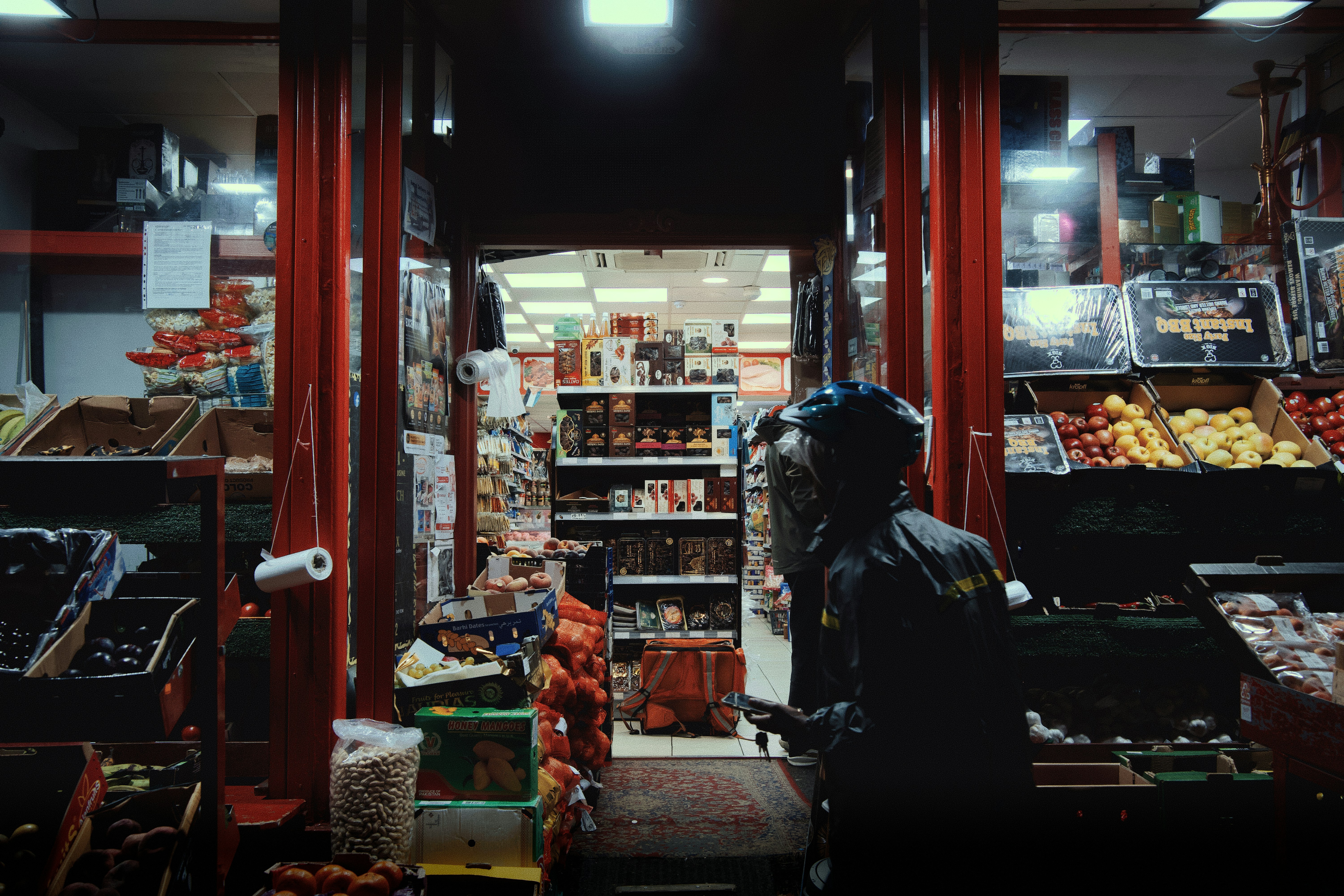 Midnight Market Muse: A Shrouded Shopper in Neon Aisles