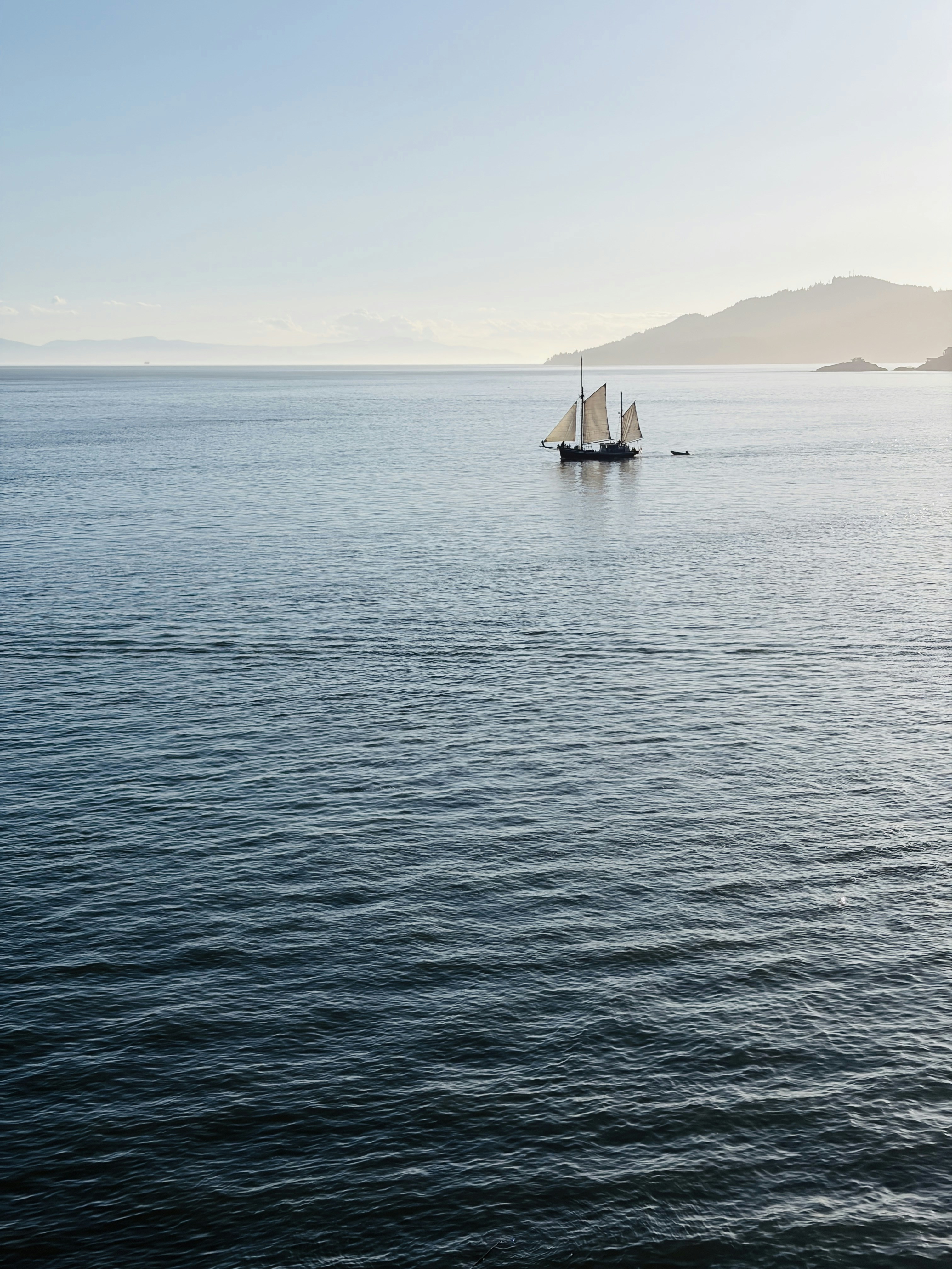 Sailboat on a Quiet Blue Horizon