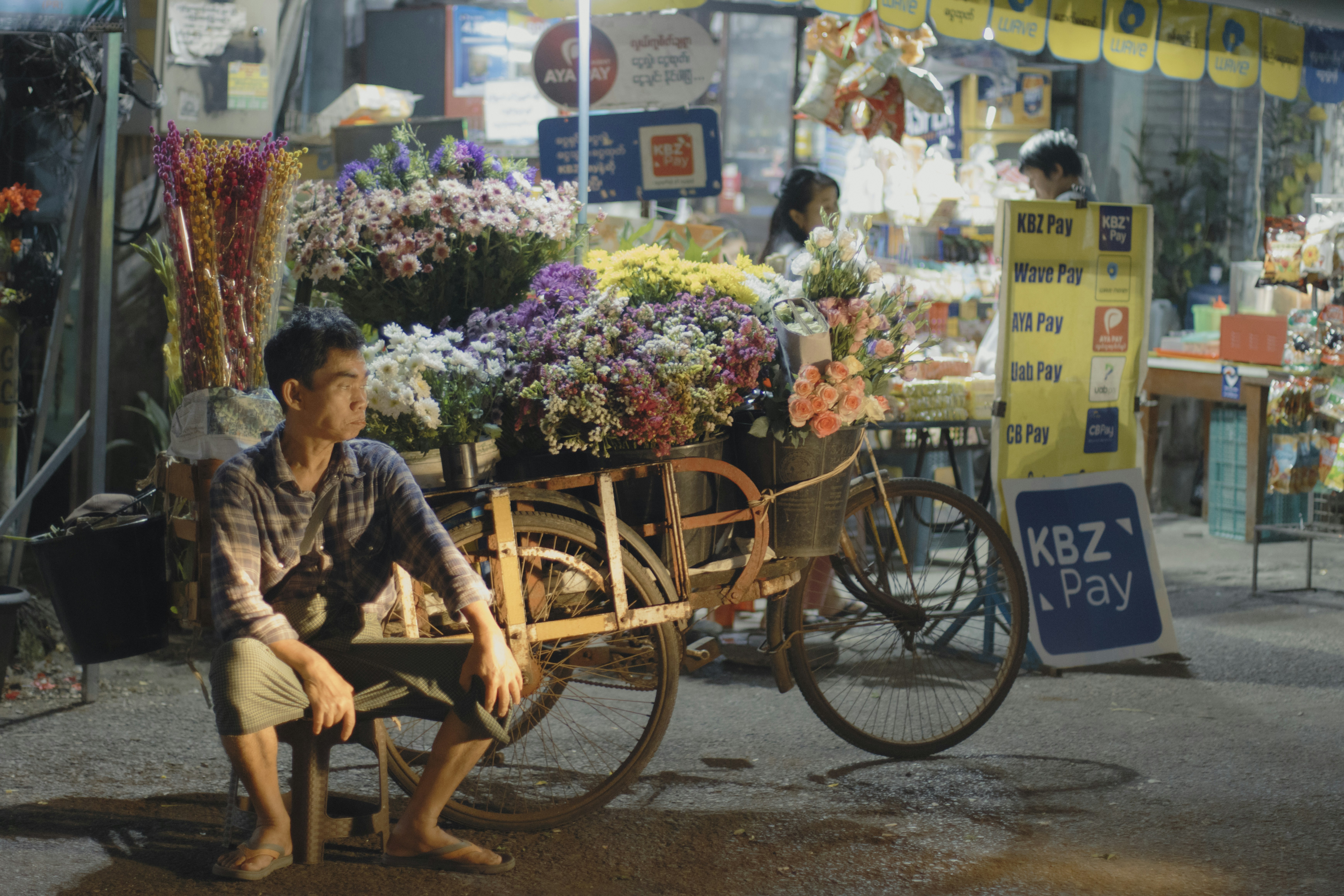 Street Flower Vendor in Soft Evening Light