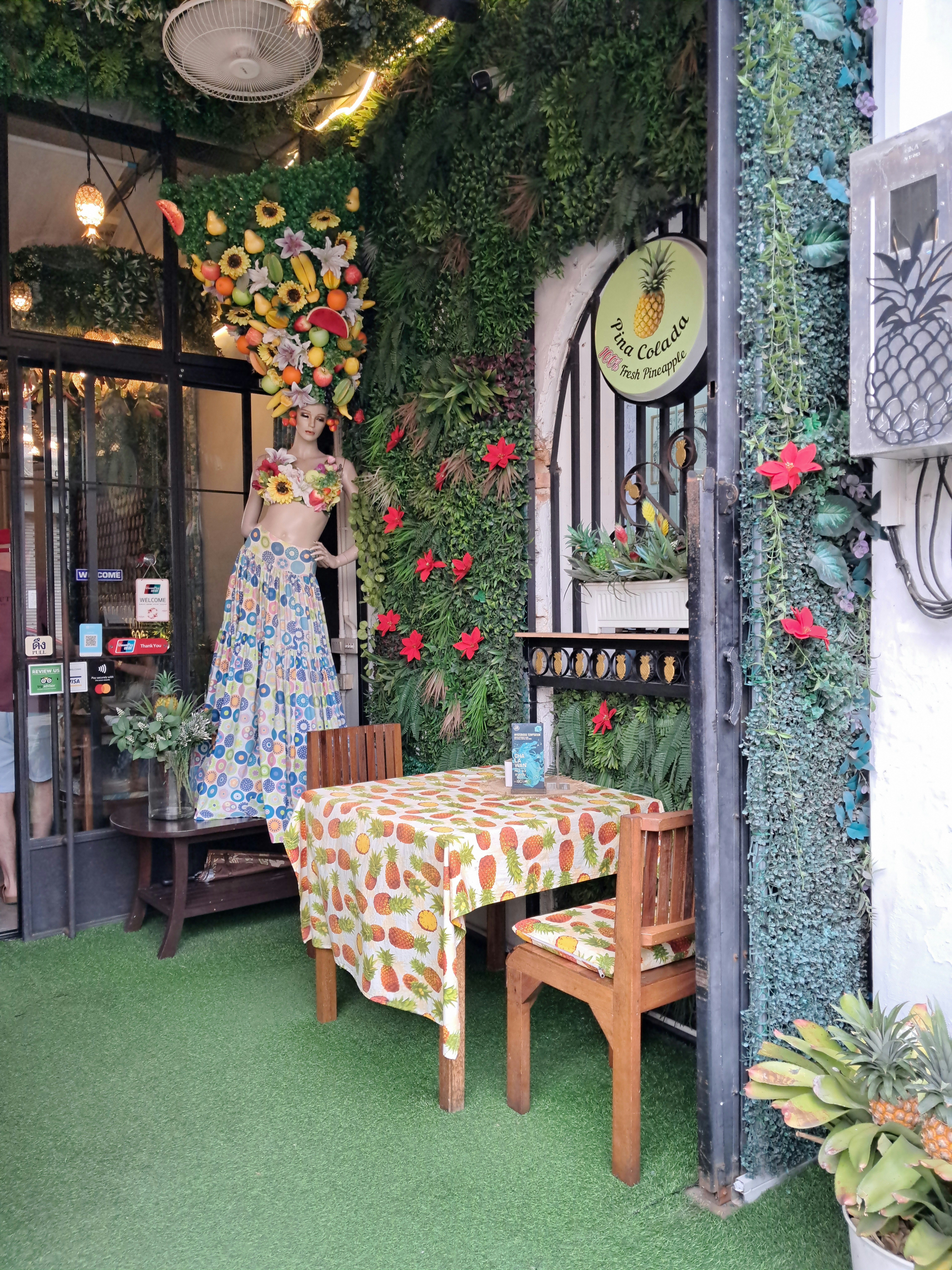 Floral Couture at a Sunlit Café