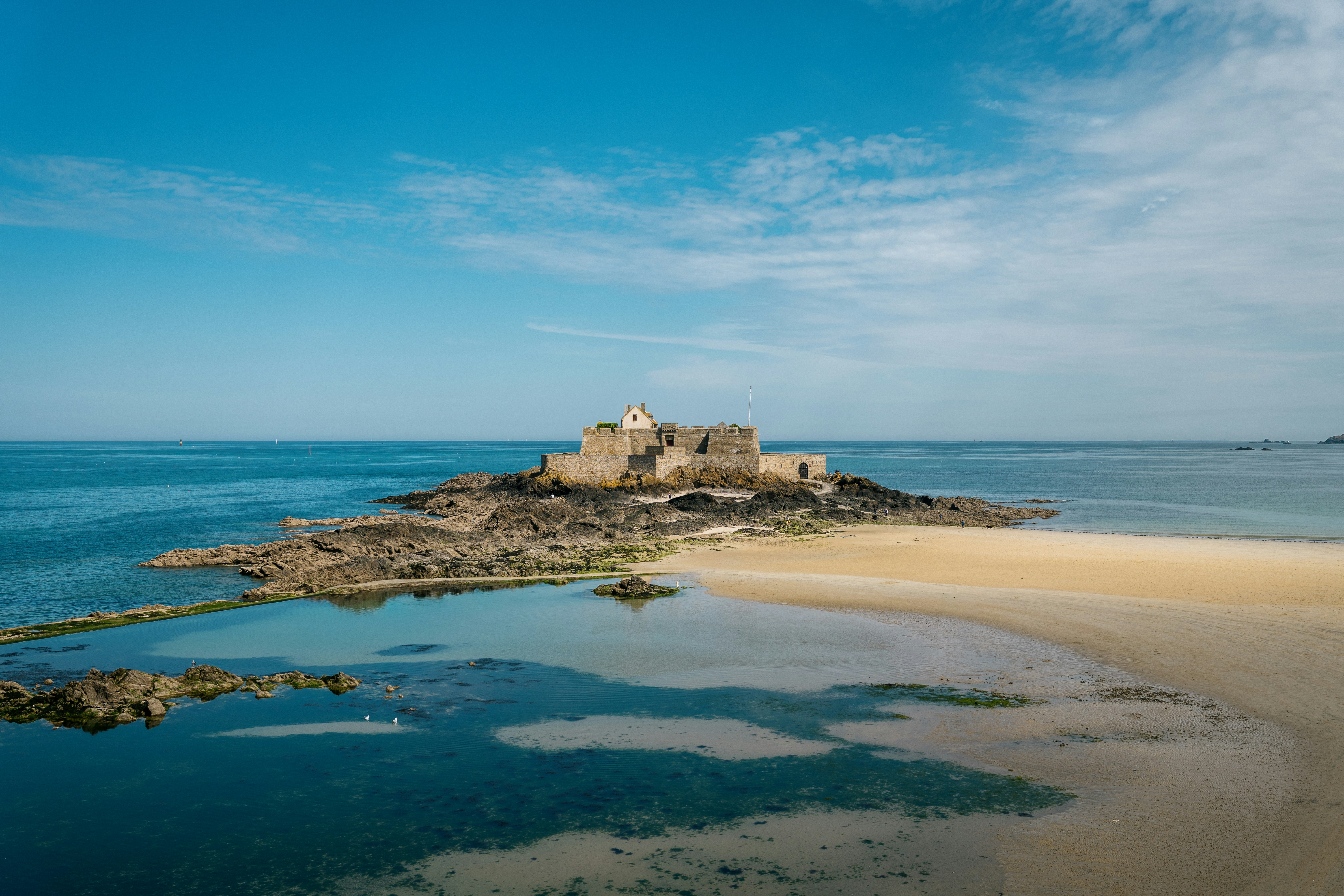 Ruined Fort on a Calm Coastal Tidal Flats