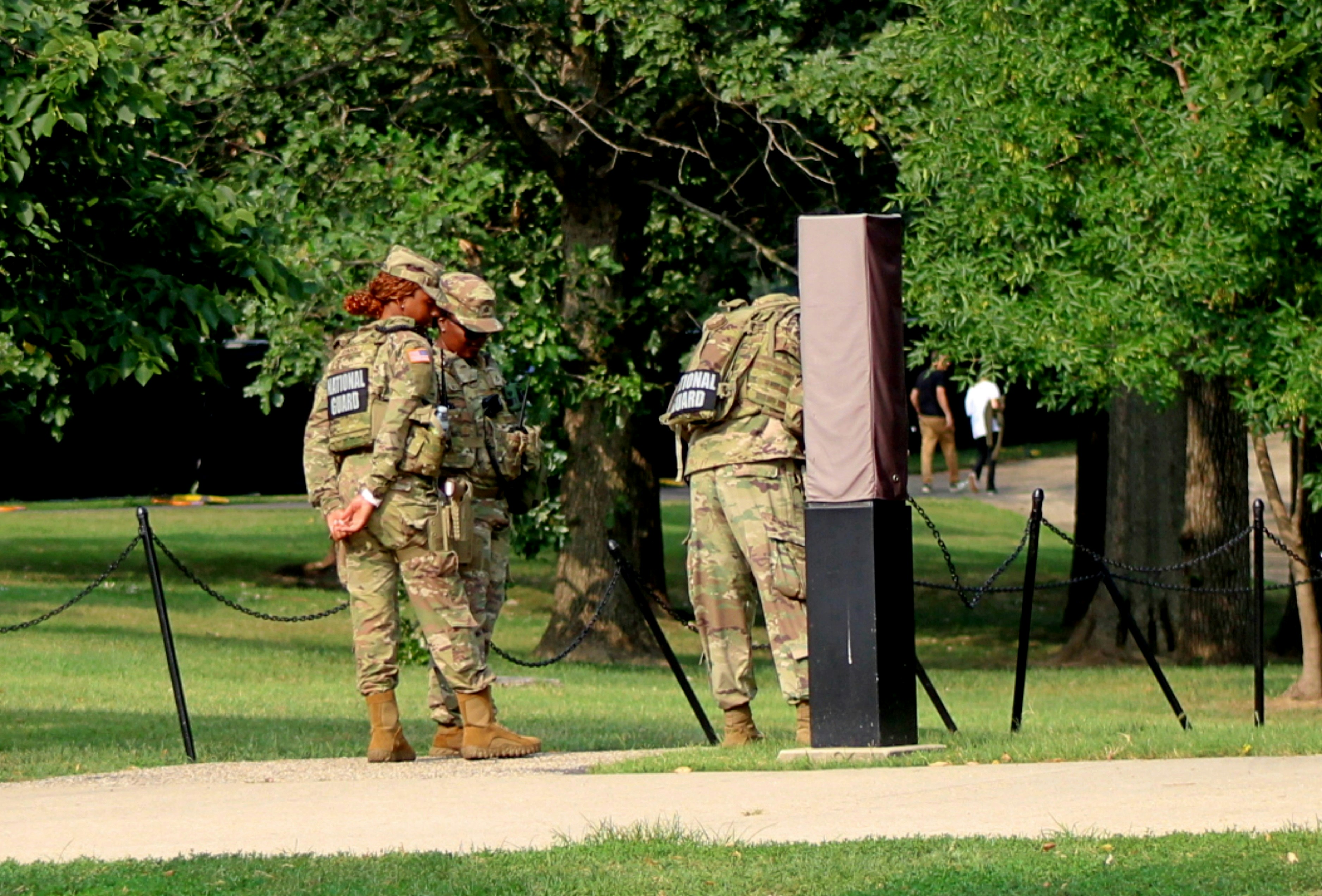 Soldiers Inspect a Training Post at the Park Boundary