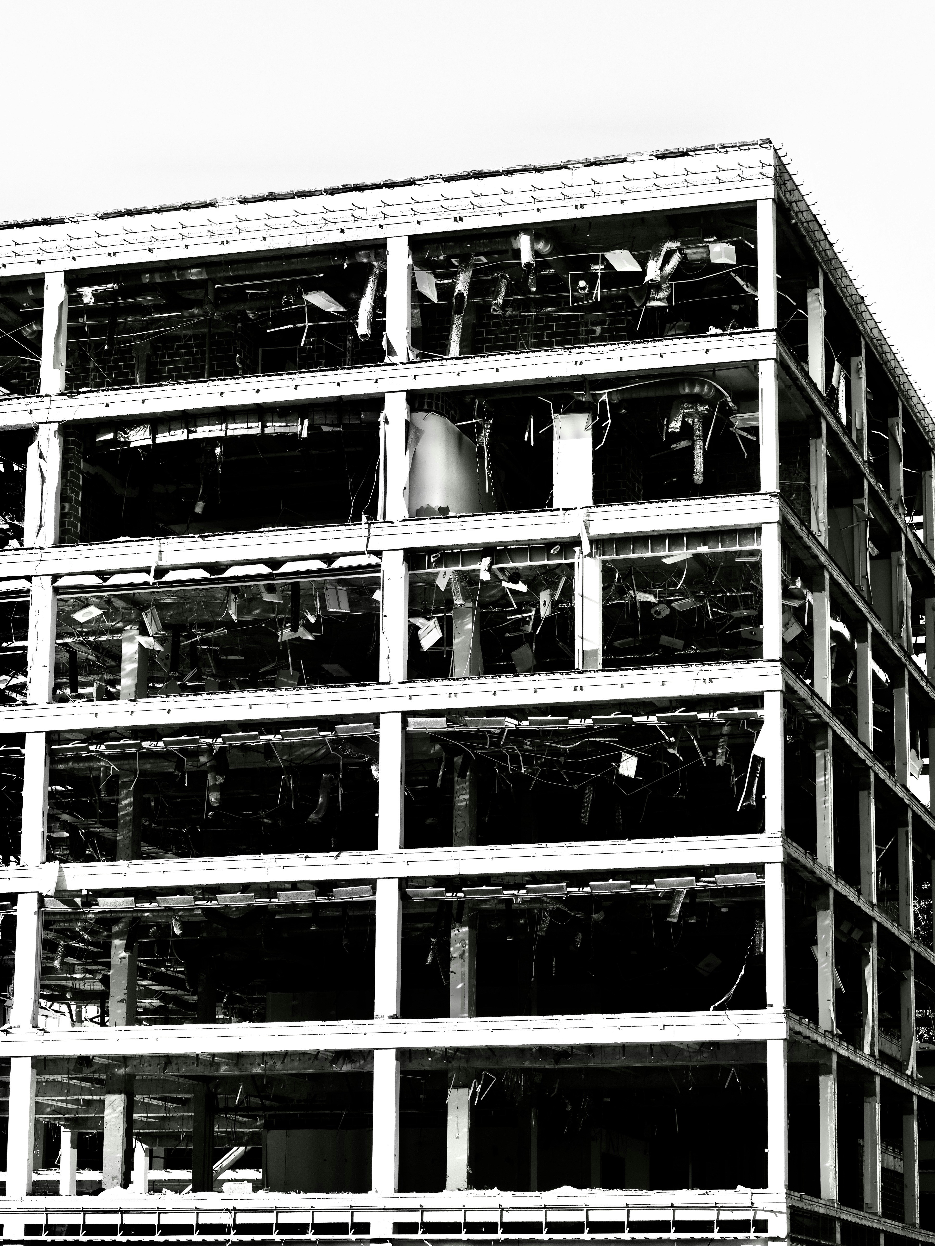 Monochrome skeleton: the gutted skeleton of a multi-story frame