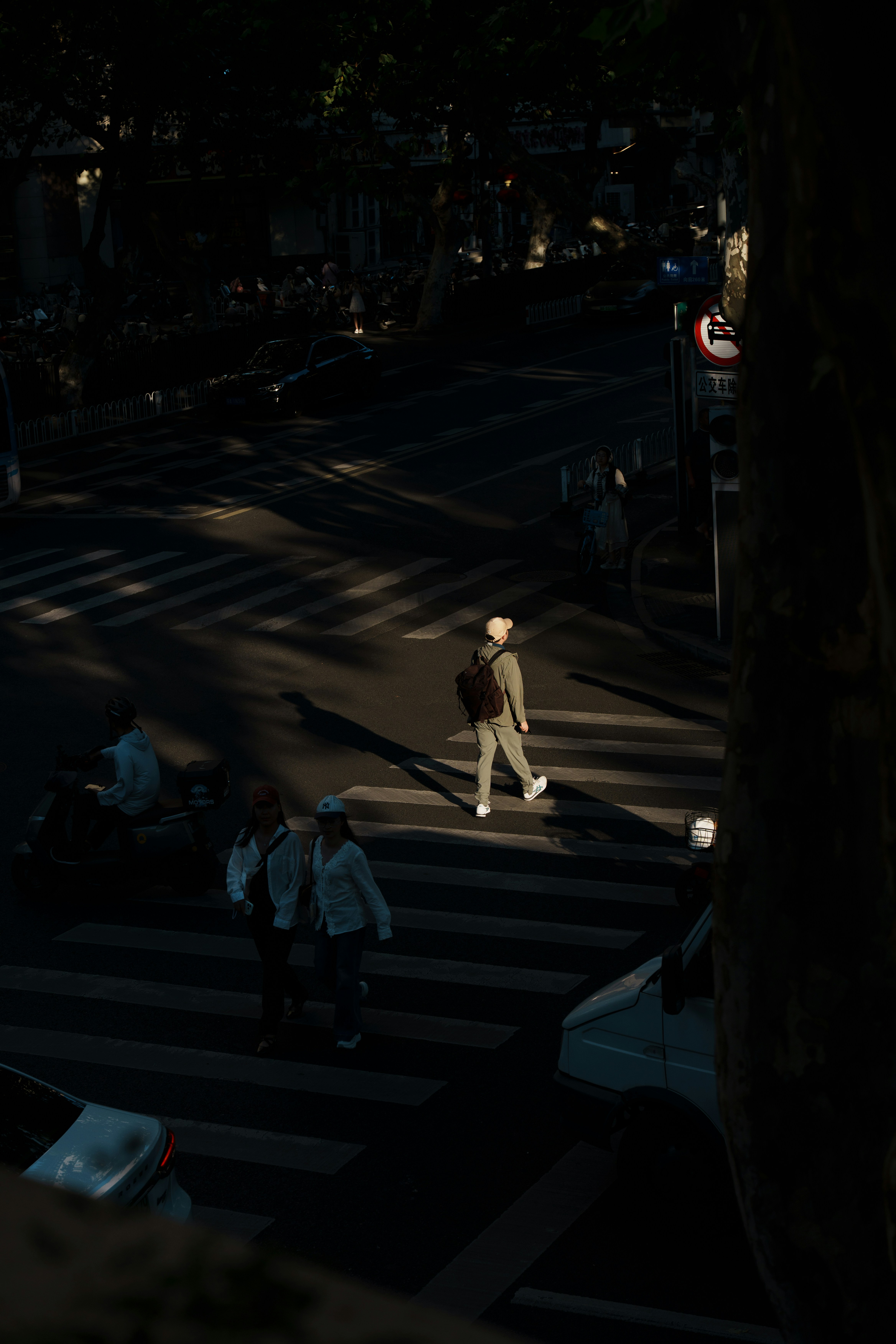 Only One in the Light: A Walker Breaks the Pedestrian Cross