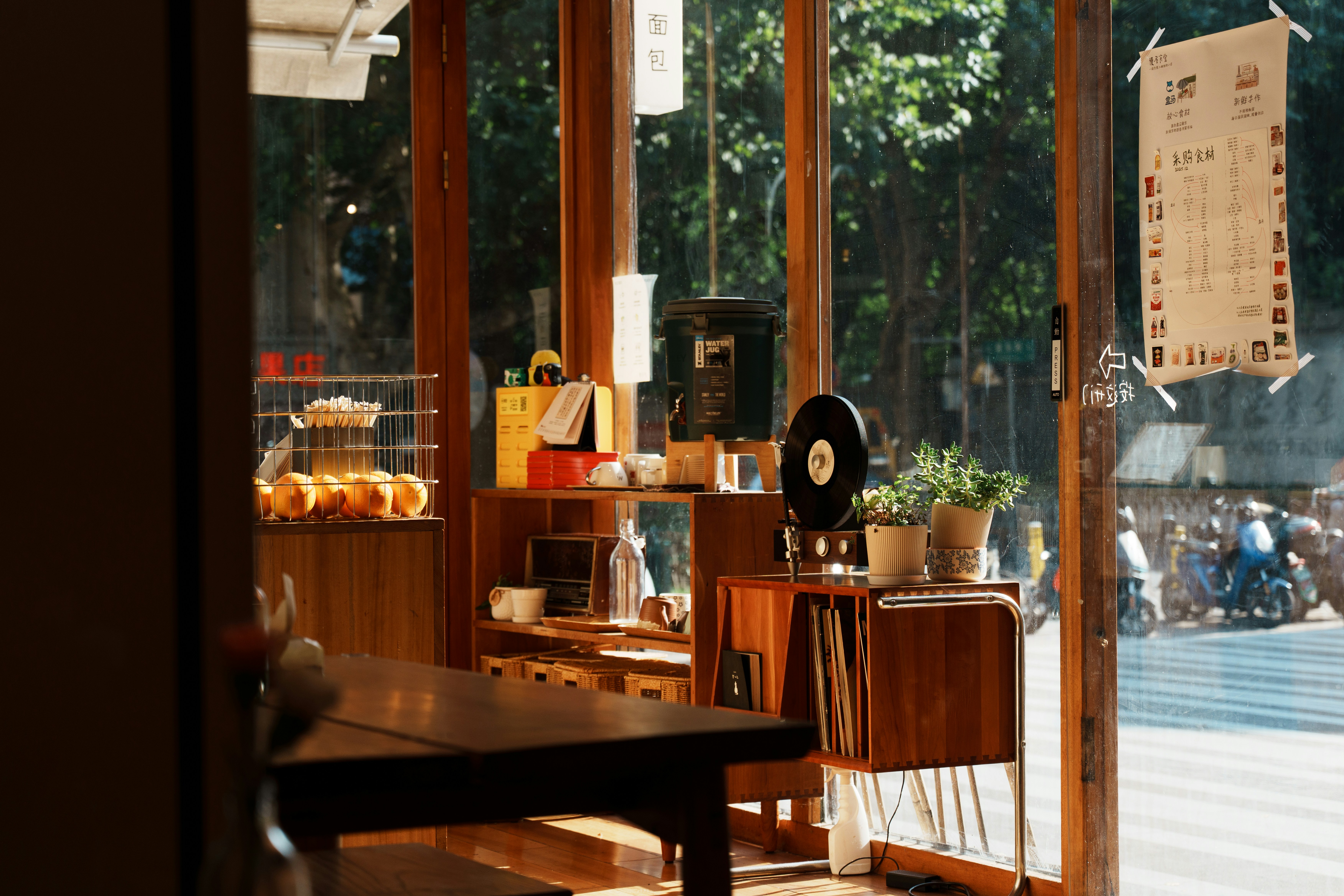 Sunlit Café Nook: A Warm Glimpse Through Glass