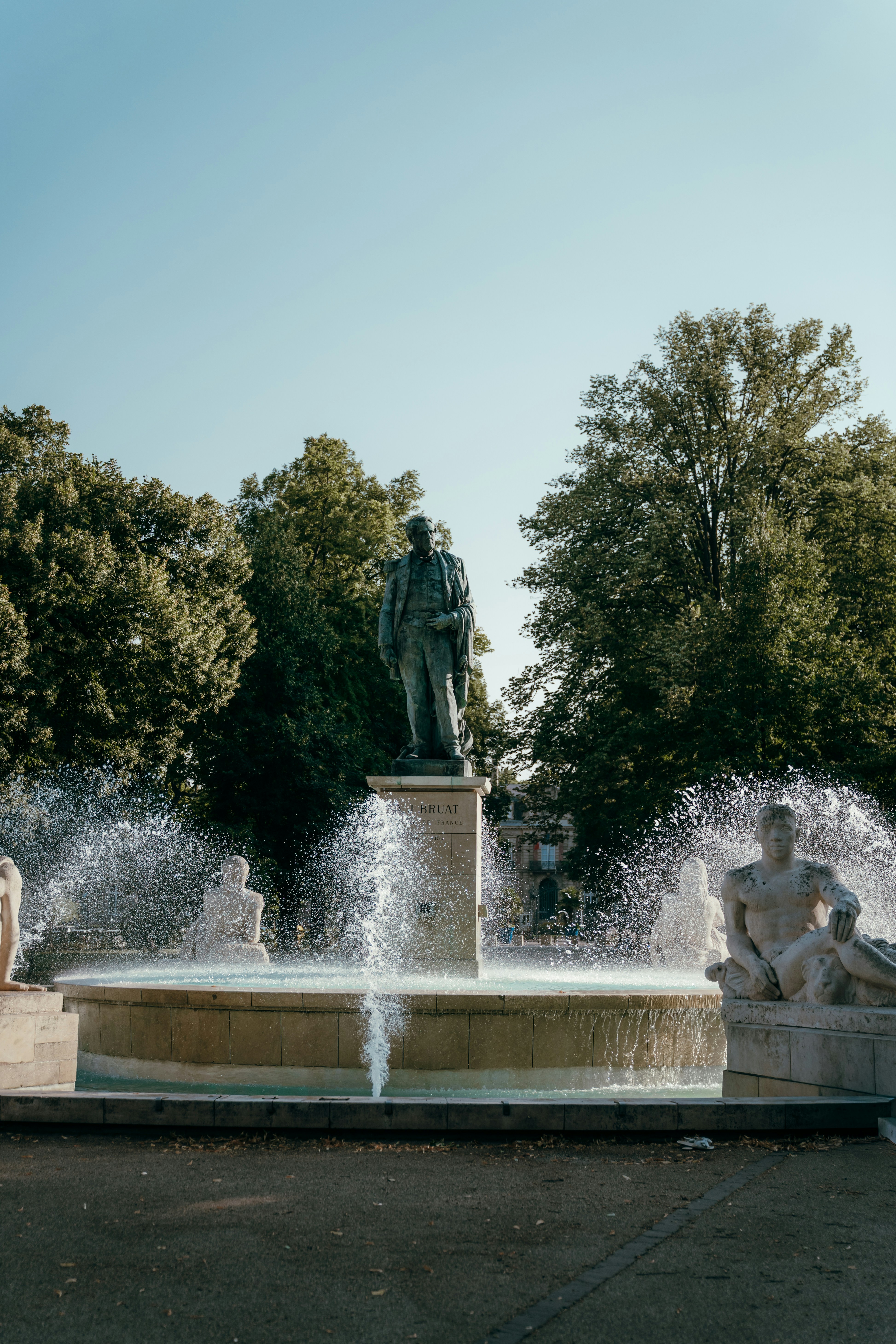 Statue in the Center of a Courtyard Fountain