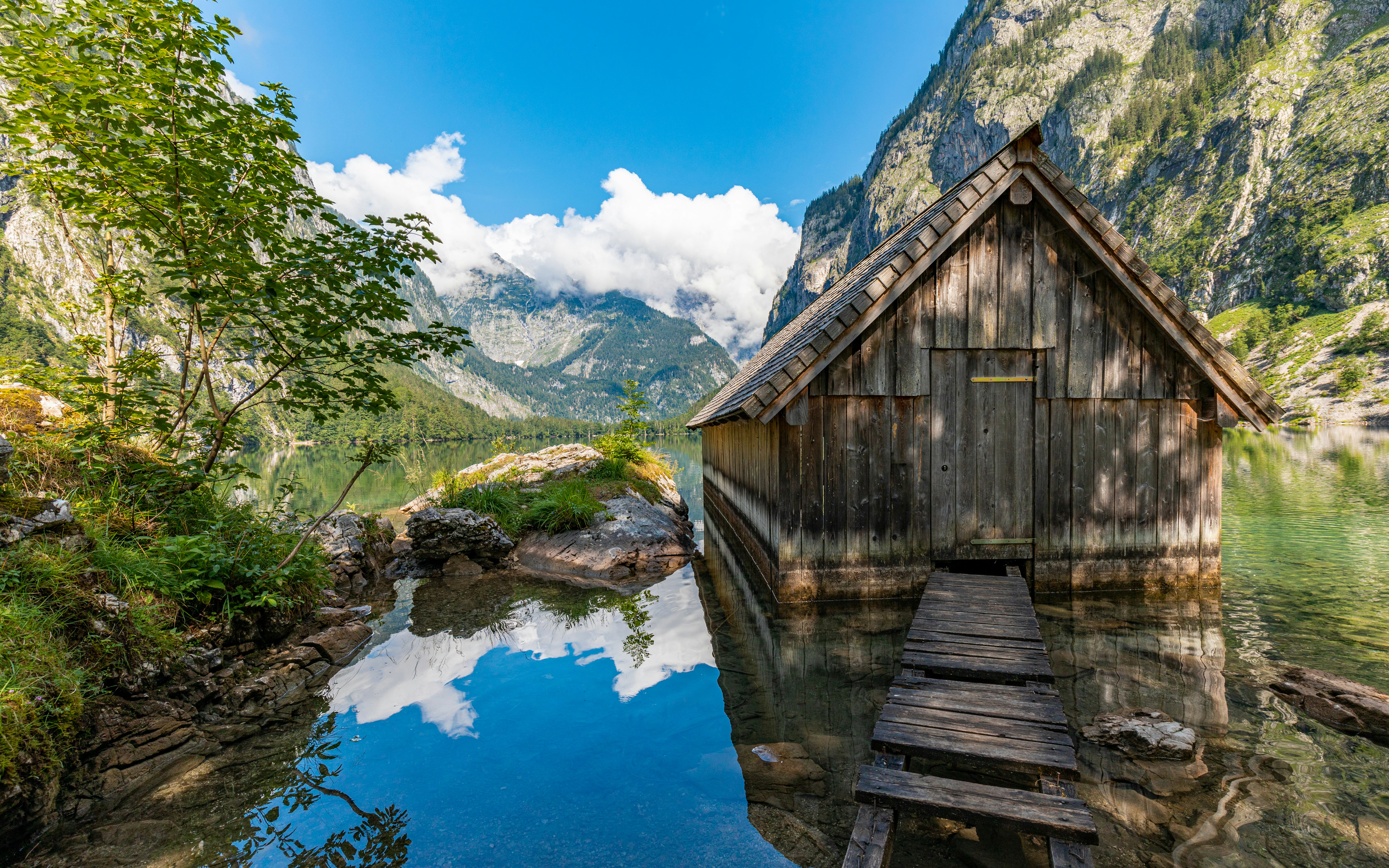 Cabin on Glassy Fjord: Reflections and Ridge